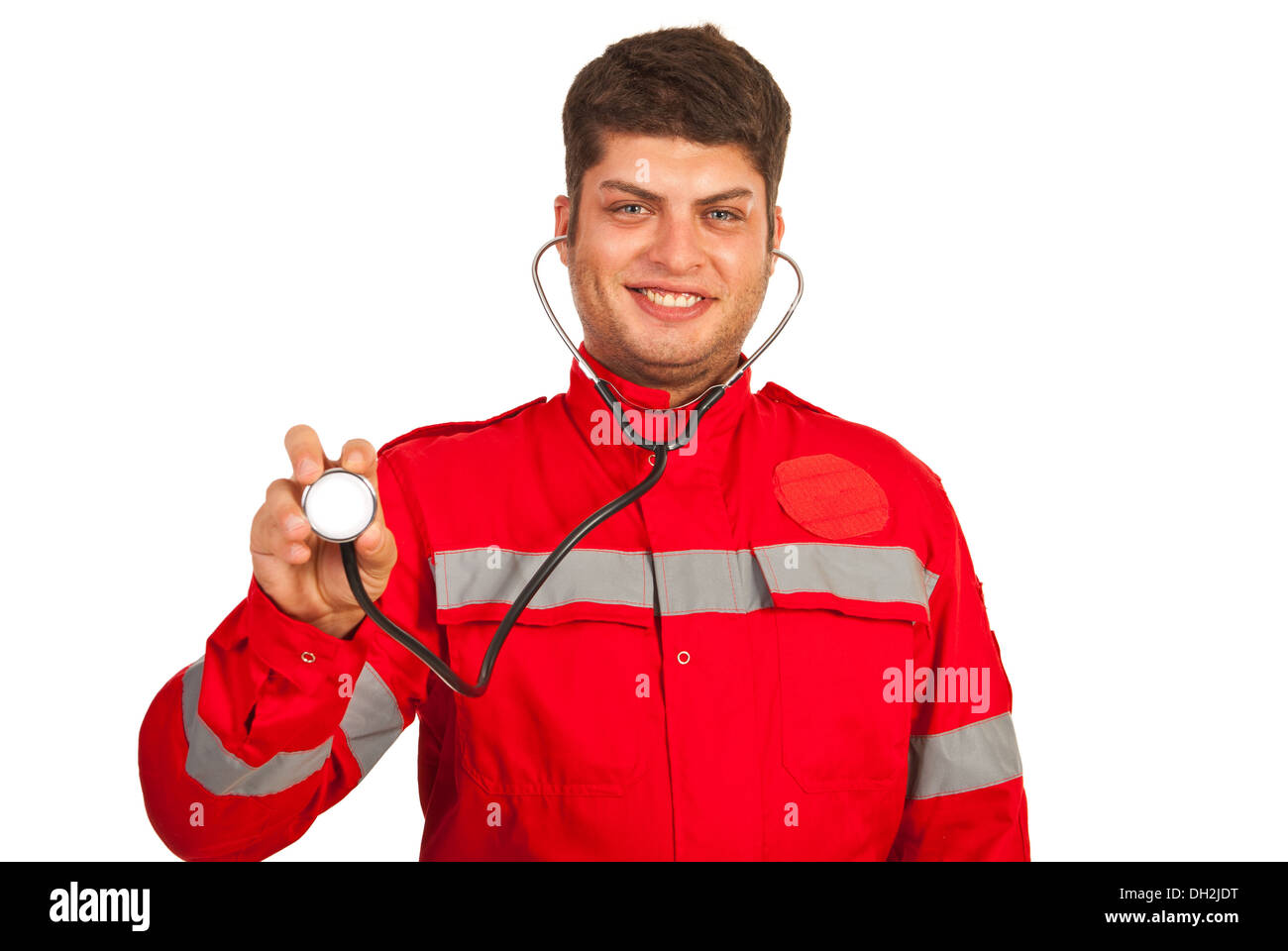 Happy paramedic man showing stethoscope isolated on white background ...