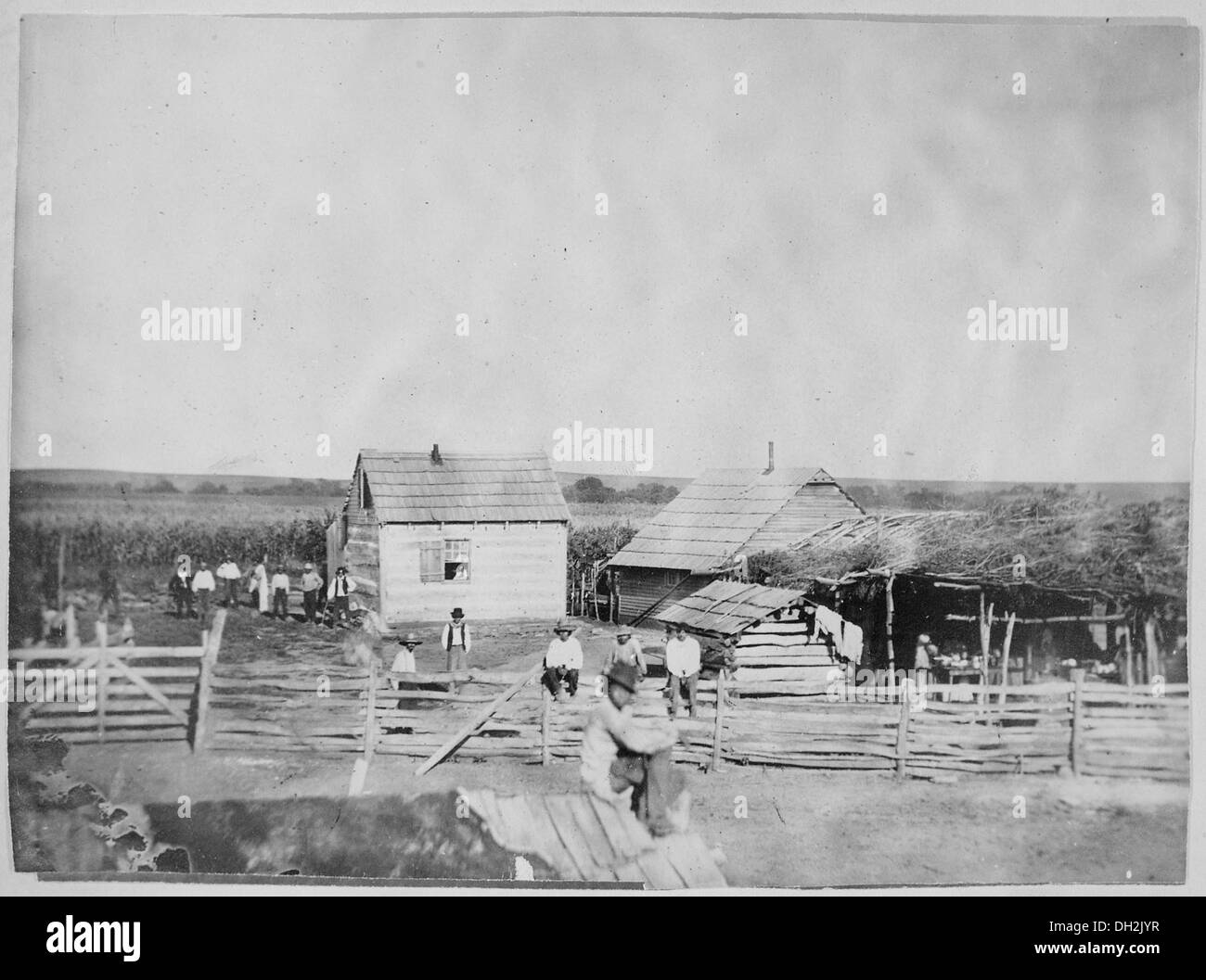 Pisehedwin, a Potawatomi, and others in front of his Kansas farm home ...