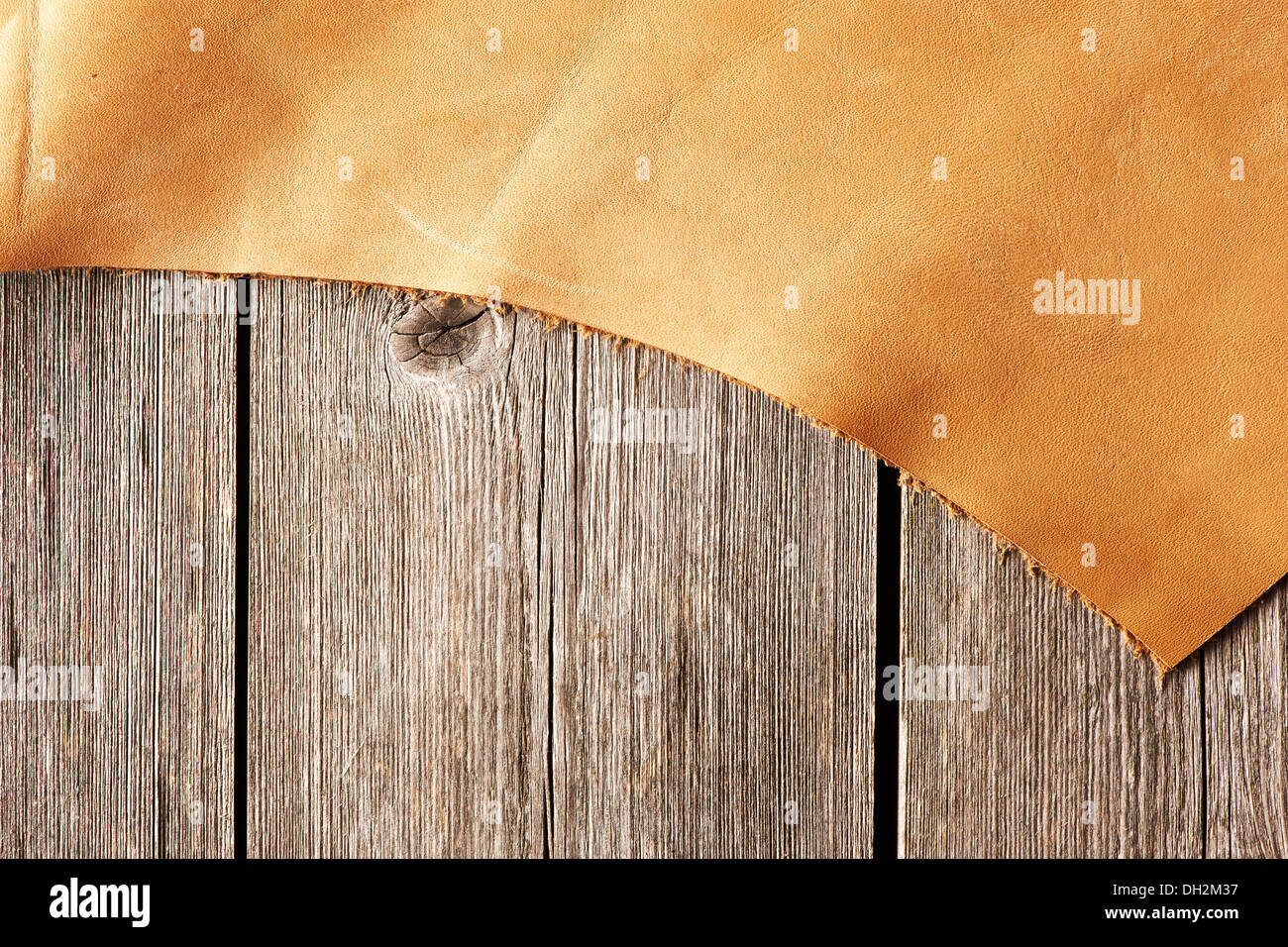 Piece of leather over wood Stock Photo - Alamy