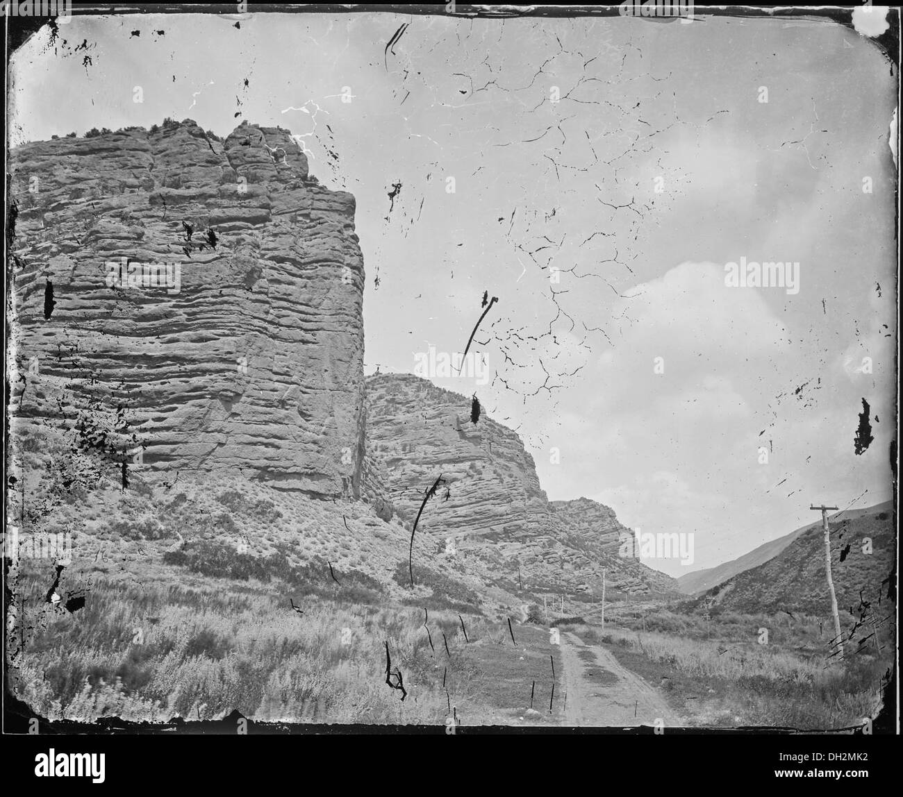 This photograph shows the Tertiary Bluffs in Echo Canyon, Utah. The ...