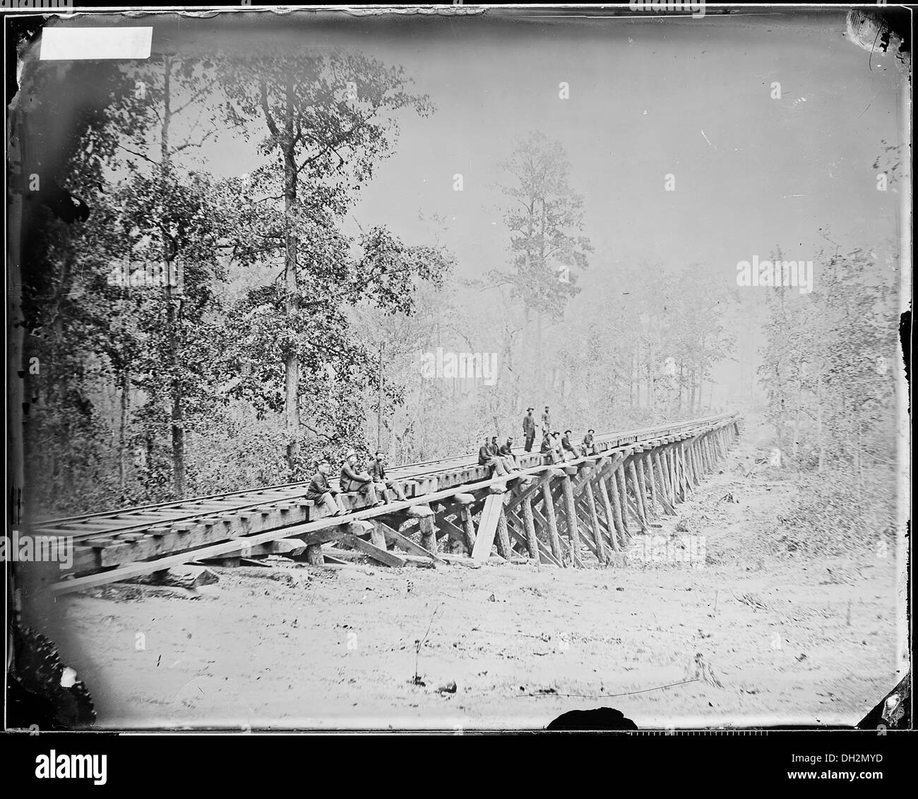 A trestle bridge, part of a railroad system, is shown in this image ...