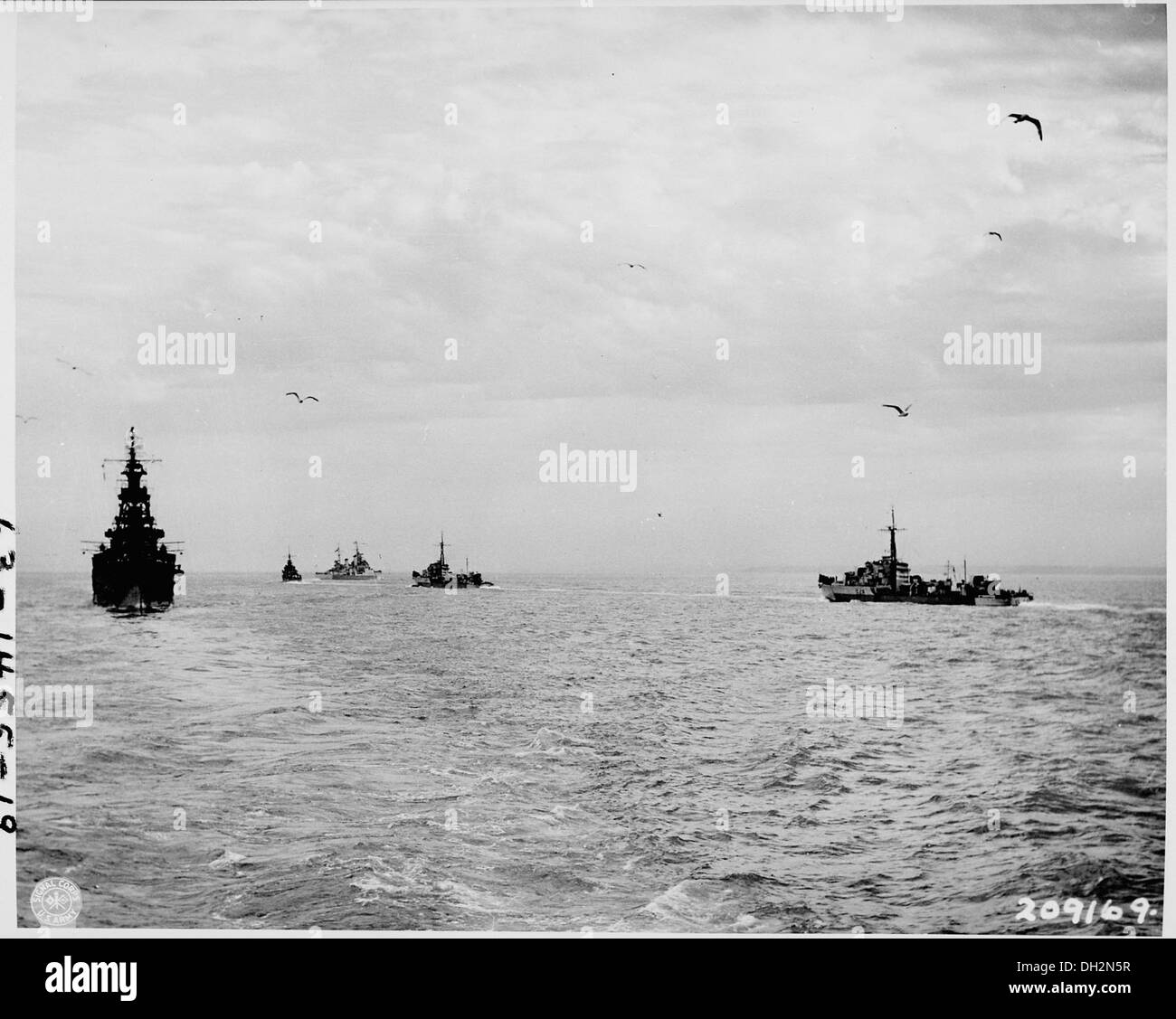 Units of the British fleet are seen escorting the U.S.S. Augusta, which ...