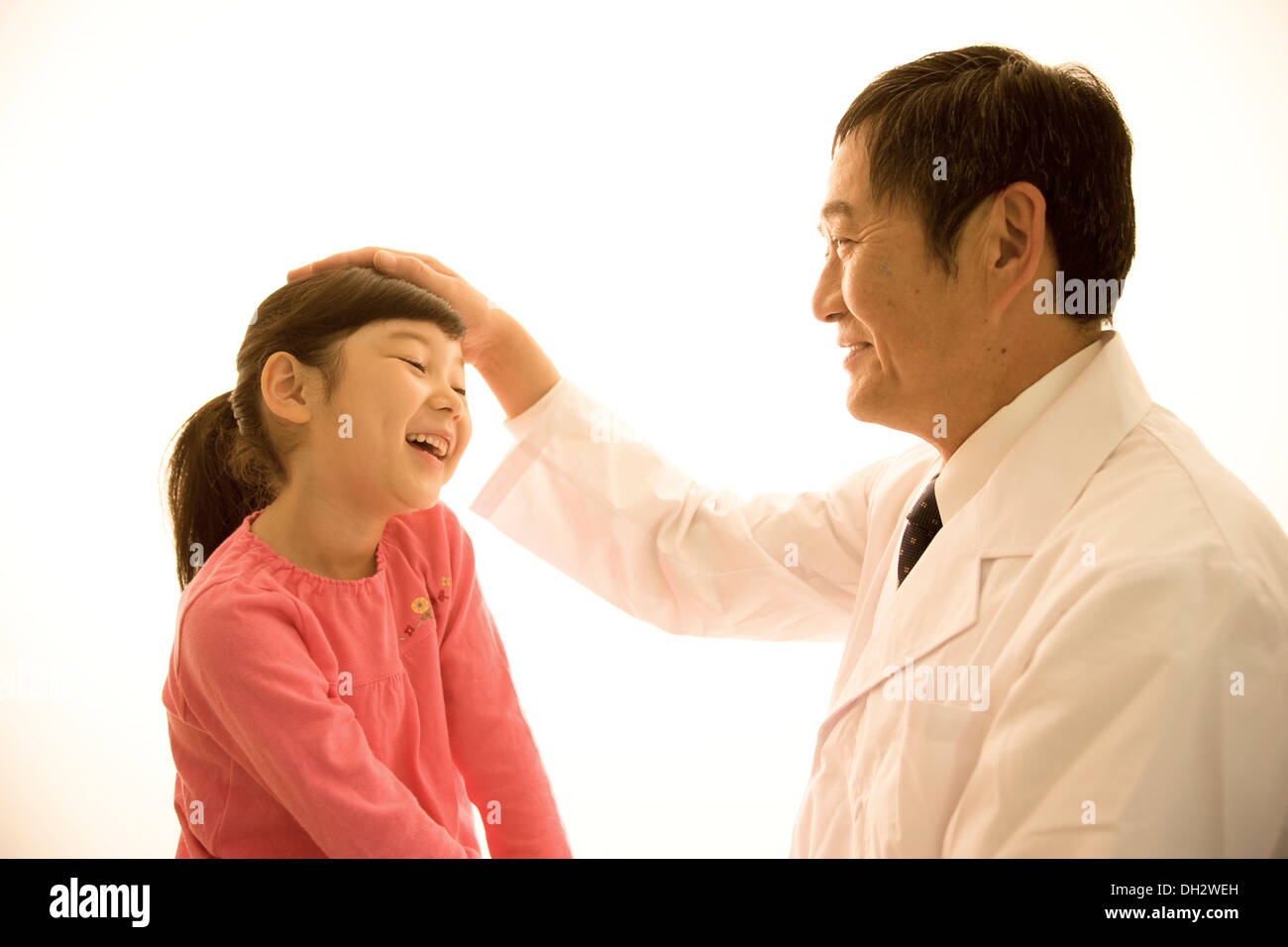 Patting On The Back High Resolution Stock Photography and Images - Alamy