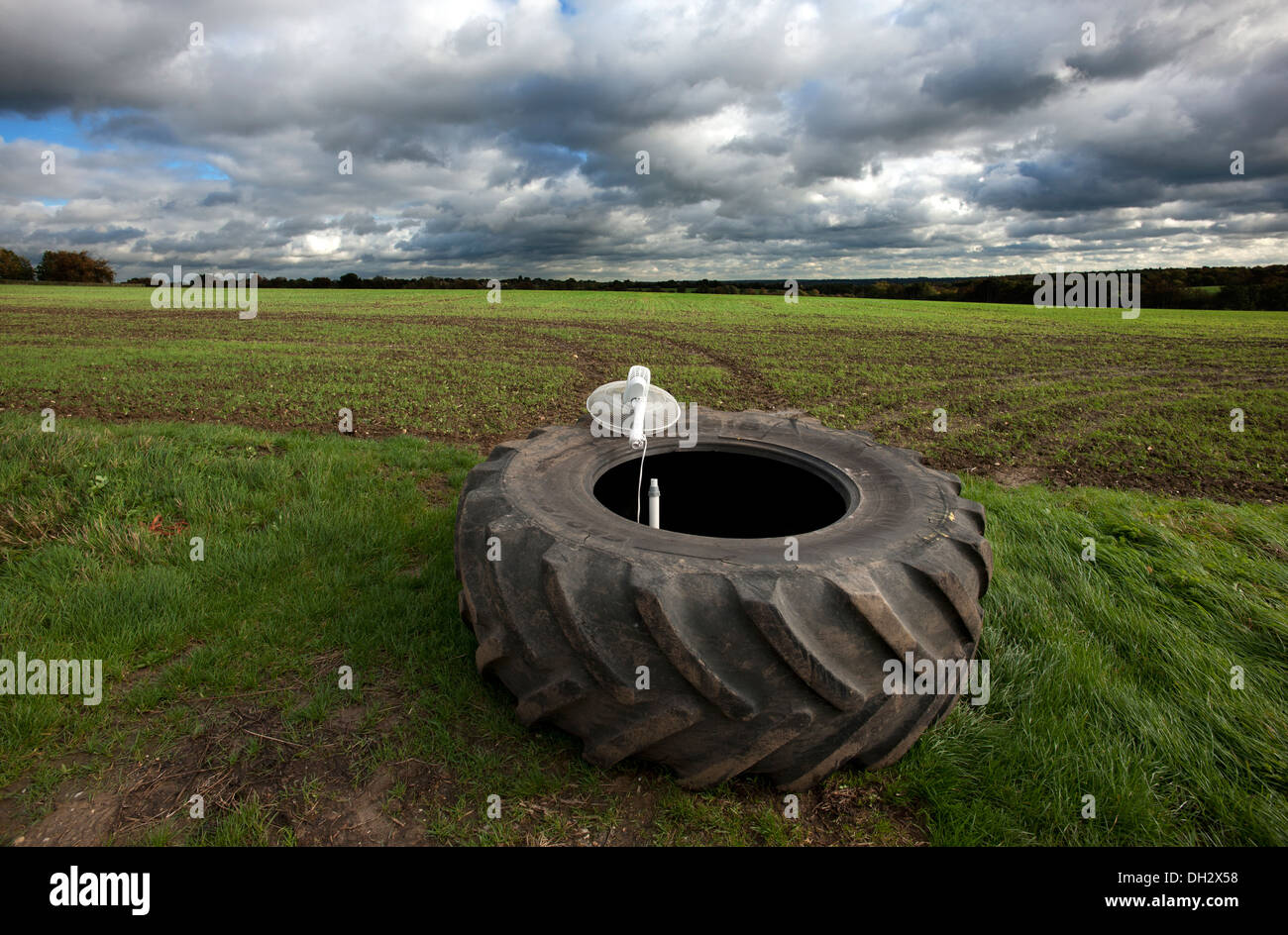 Tractor Tyre in a Field with a Fan. Essex, England, UK. 28 October 2013 ...