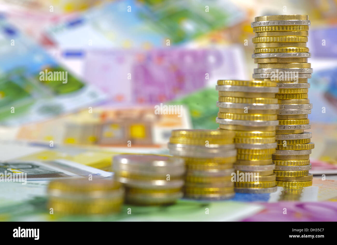 euro coins as chart show success Stock Photo - Alamy