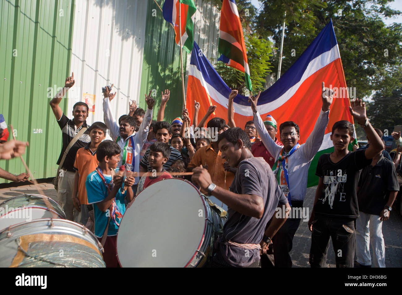 men supporters celebrating MNS candidate election victory shouting ...