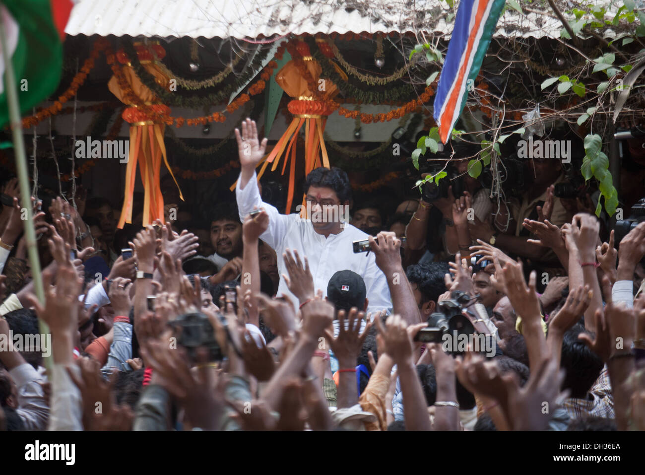 Raj Thackeray chief of Maharashtra Navnirman Sena waving to supporters ...