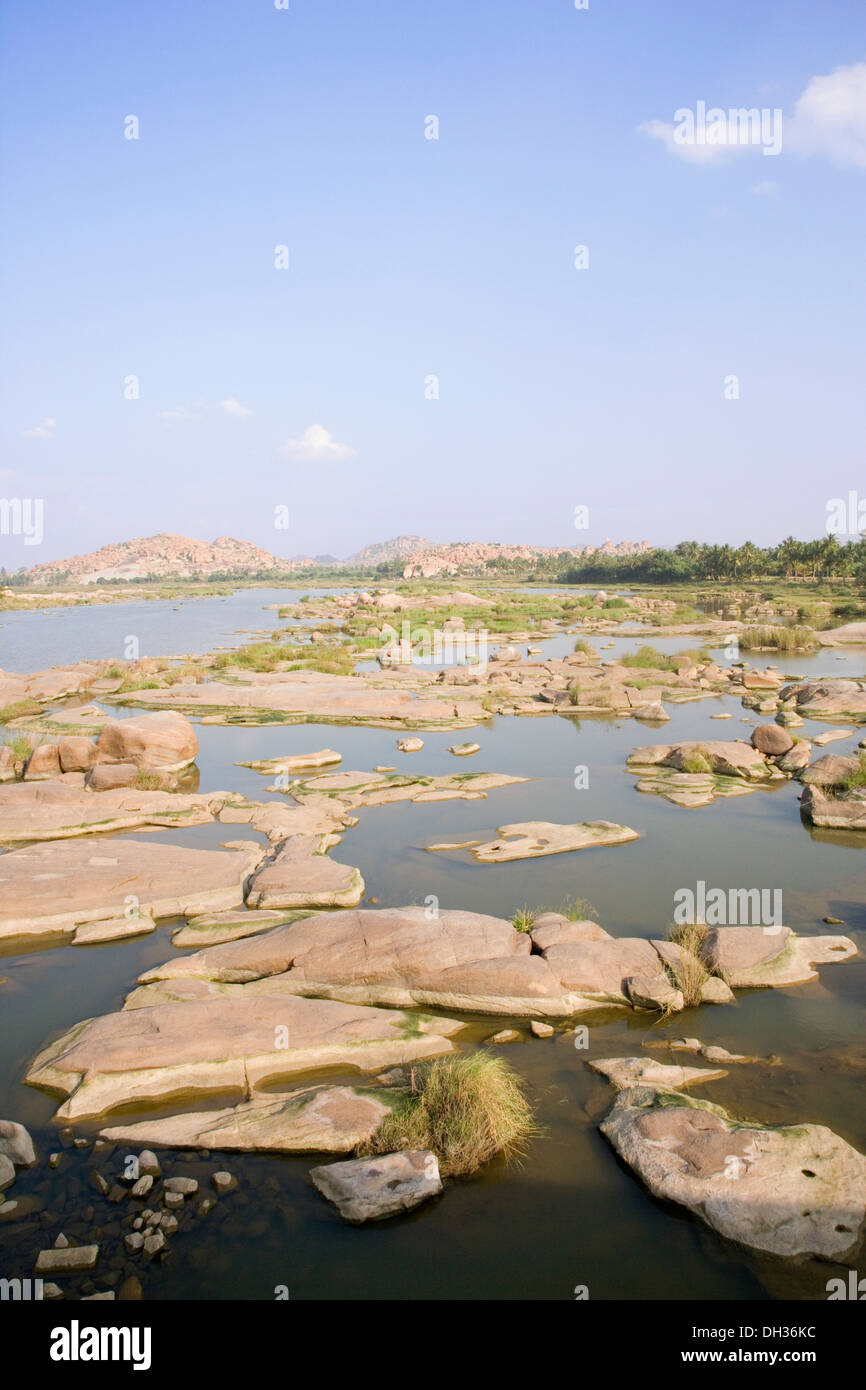 Rock on a water surface, Hampi, Karnataka, India Stock Photo - Alamy
