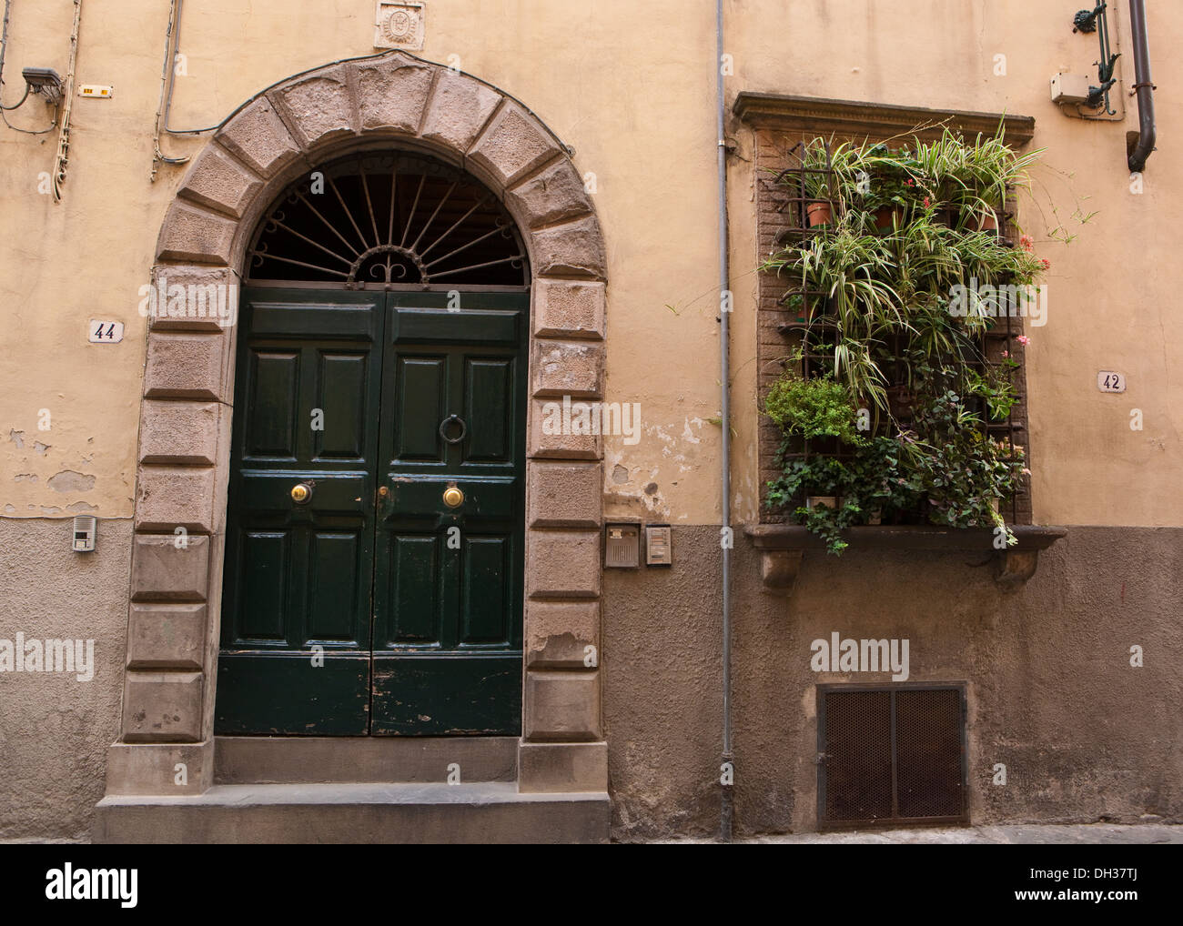 A house front in the street of the medieval town of Luca, Italy Stock ...
