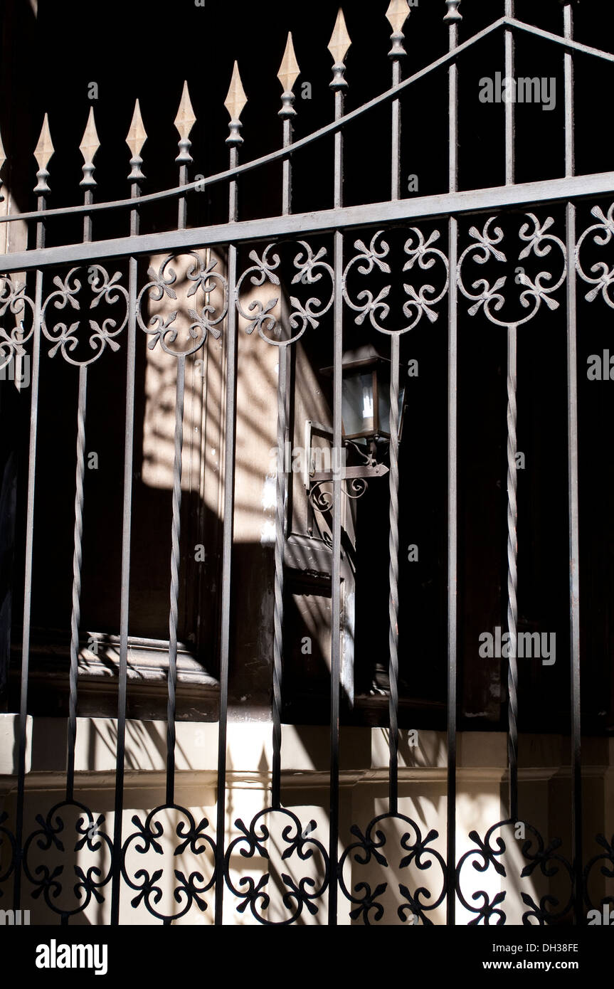 Gate with shadows, Rome, Italy Stock Photo - Alamy