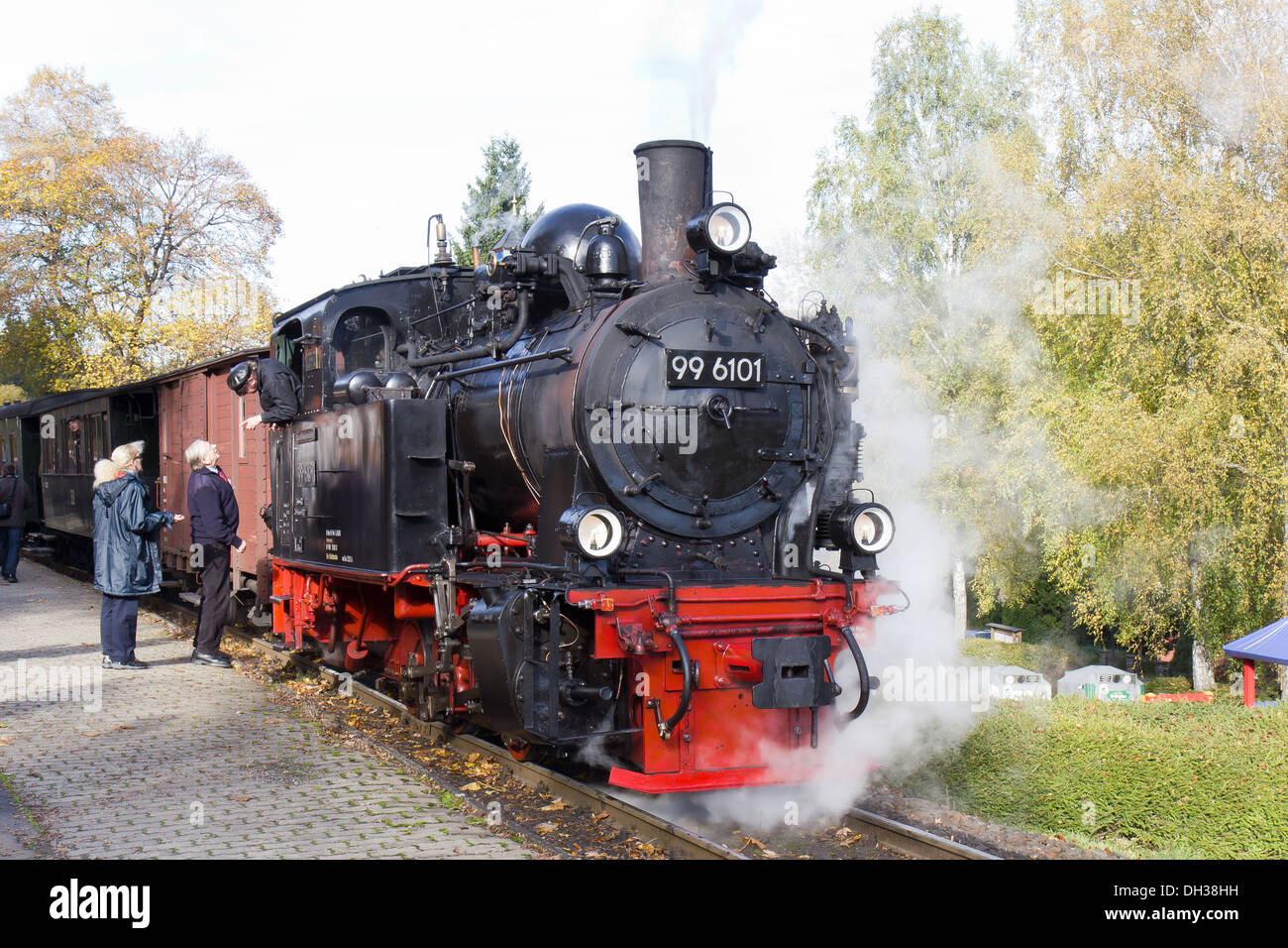 A Steam locomotive pulling a passenger train on the Harz Mountain ...