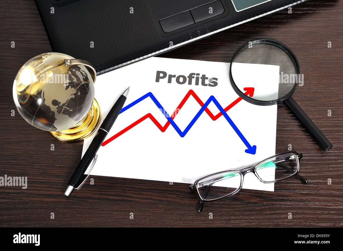 workplace with growth chart on paper Stock Photo - Alamy