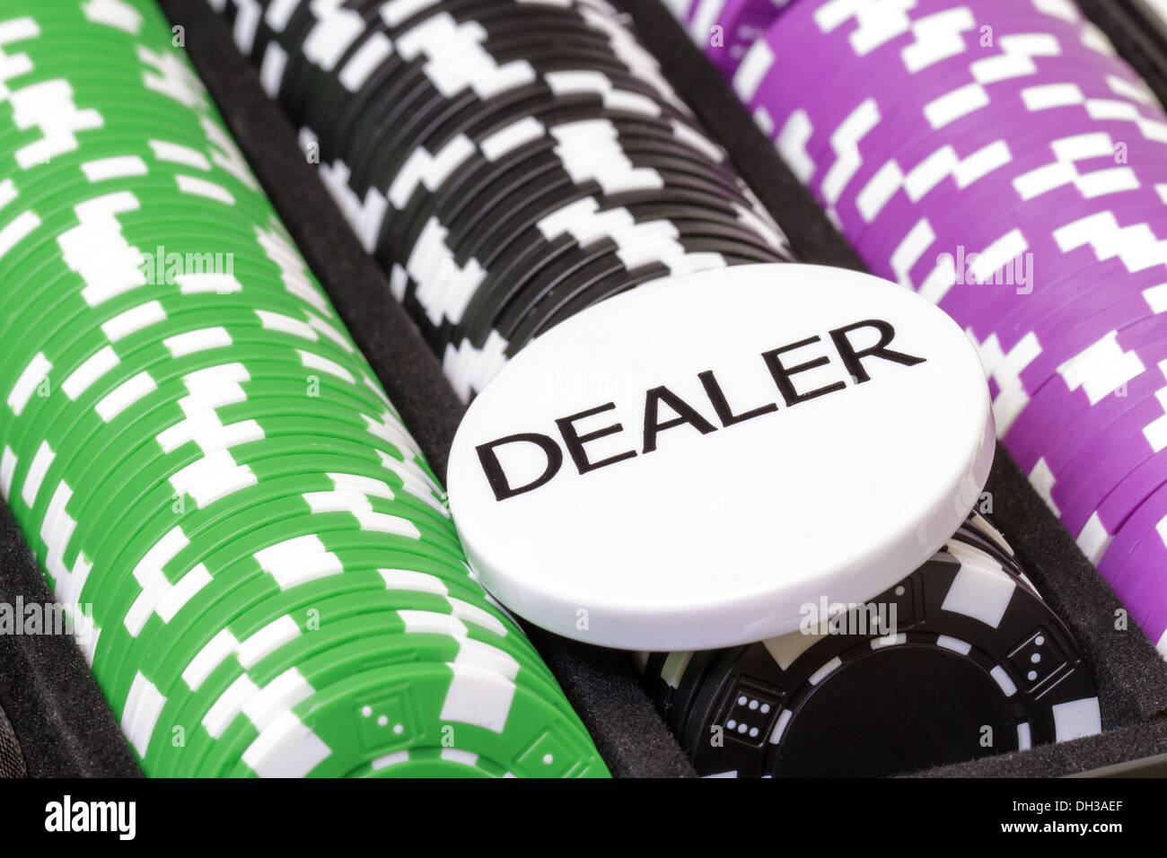 Set of poker chips and dealer button Stock Photo - Alamy