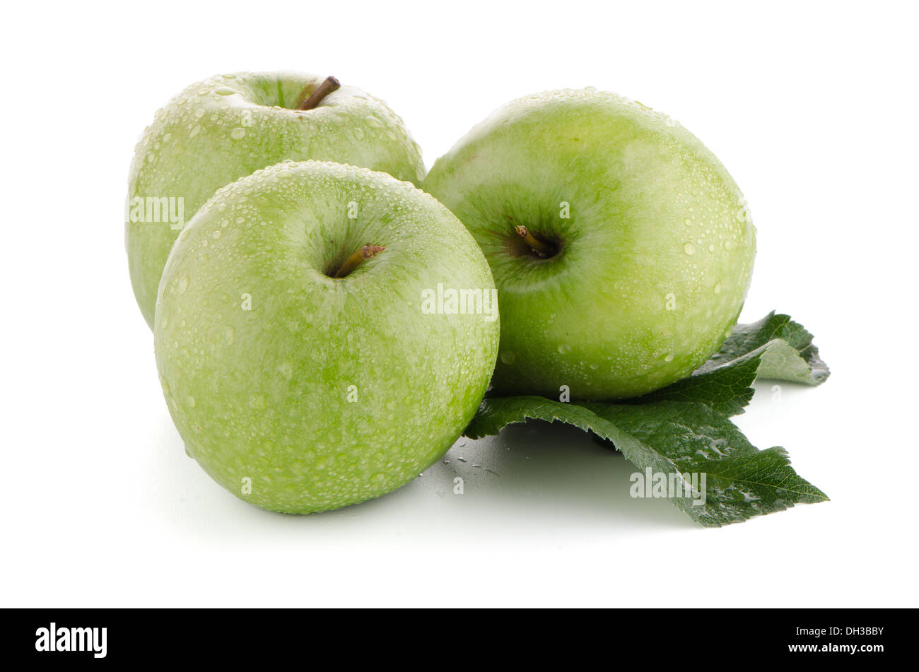 Three fresh green apples on white background Stock Photo - Alamy