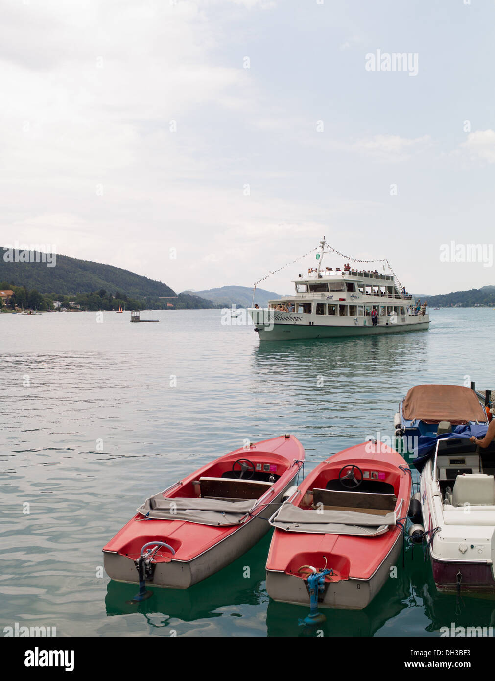 a view of the vibrant lake at Velden Am Worthersee in Austria Carinthia ...