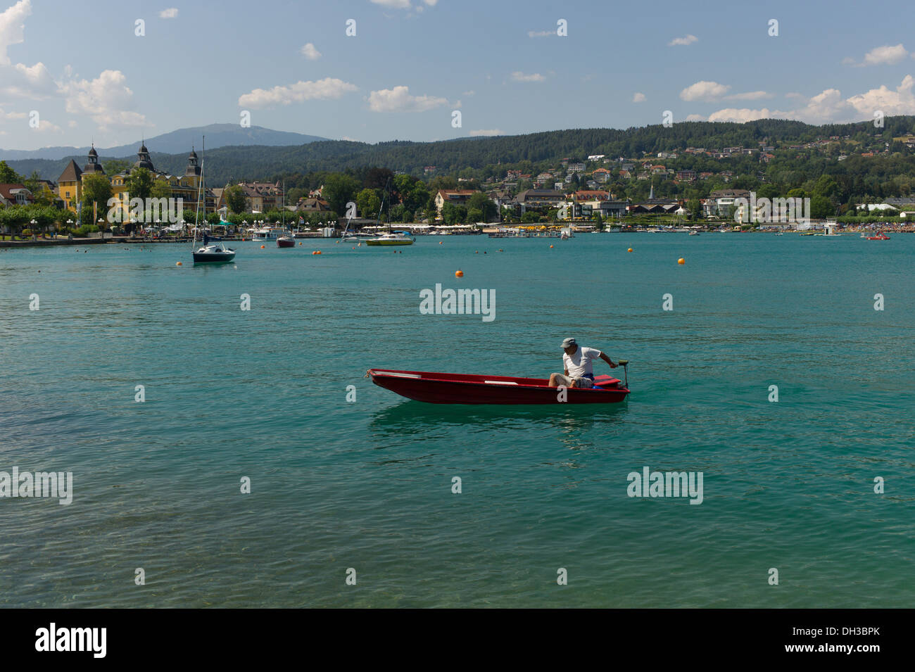 a view of the vibrant lake at Velden Am Worthersee in Austria Carinthia ...