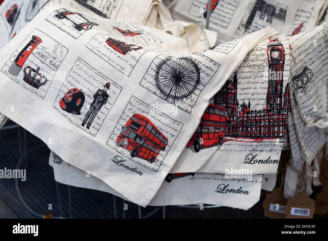 cotton tea towel printed with illustrations of famous London landmarks ...