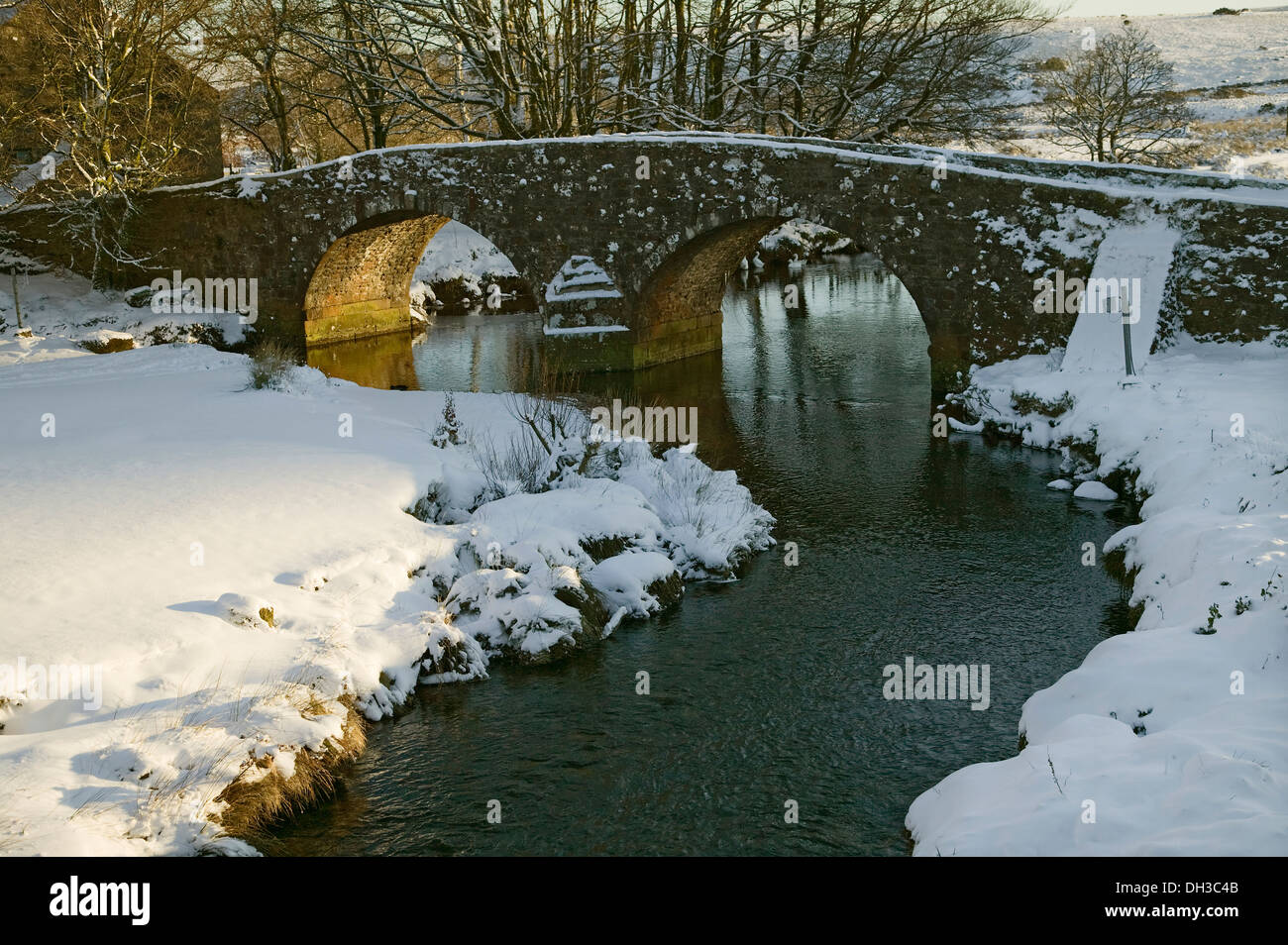 Coach bridge and West Dart River in snowy conditions, at Two Bridges ...