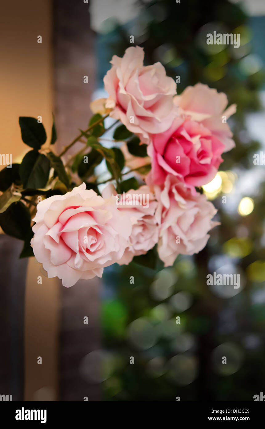 Bouquet of plastic roses and in ceramic vase Stock Photo - Alamy