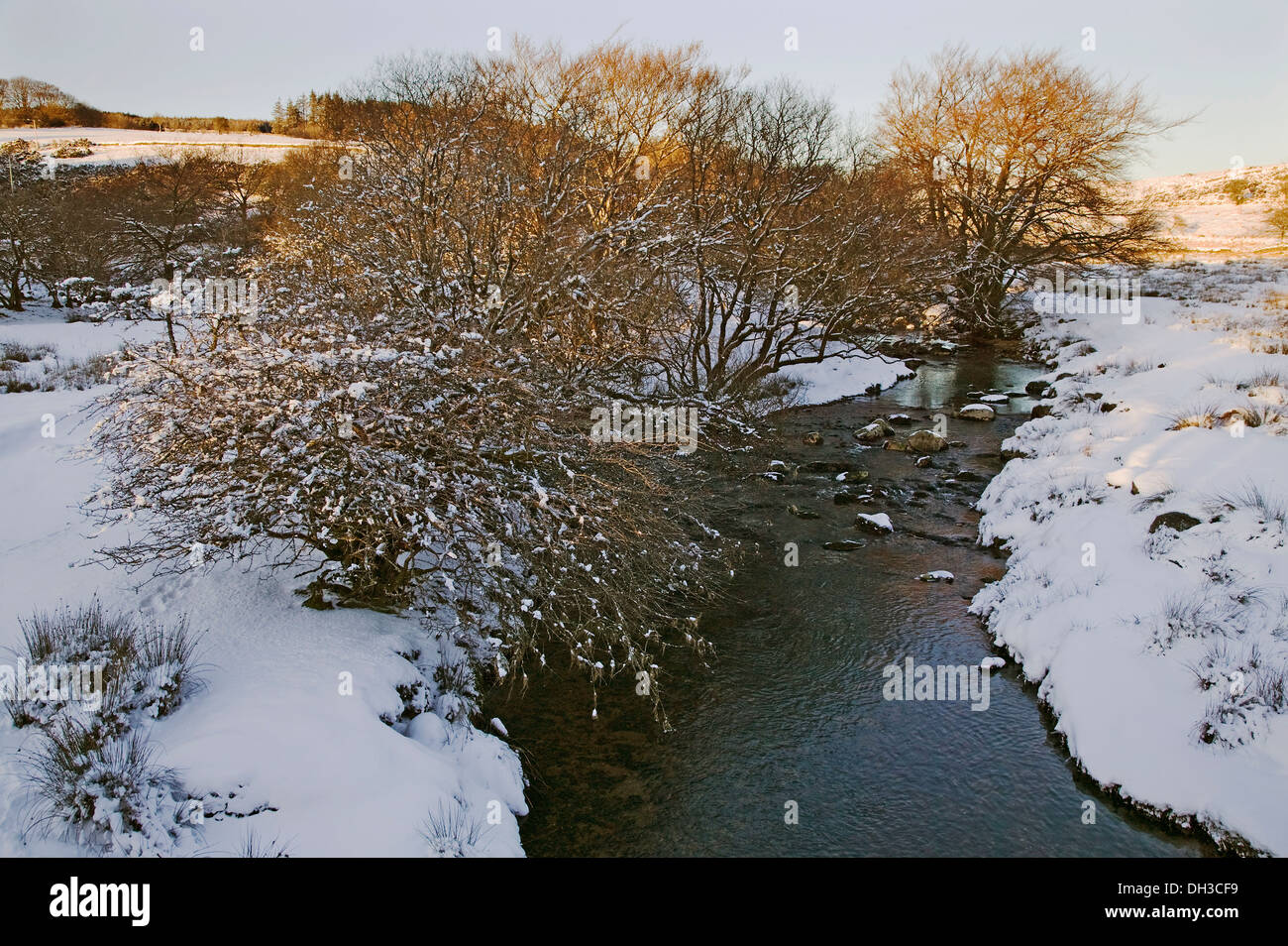 West Dart River in snowy conditions, at Two Bridges, Dartmoor National ...