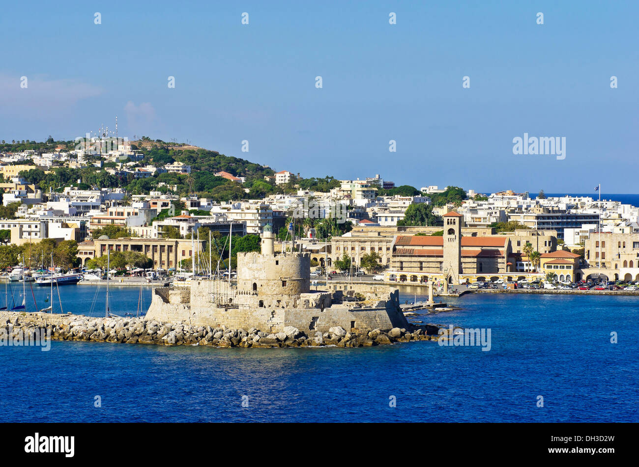 Harbour entrance of Rhodes with the fortified tower of Agios Nikolaos ...