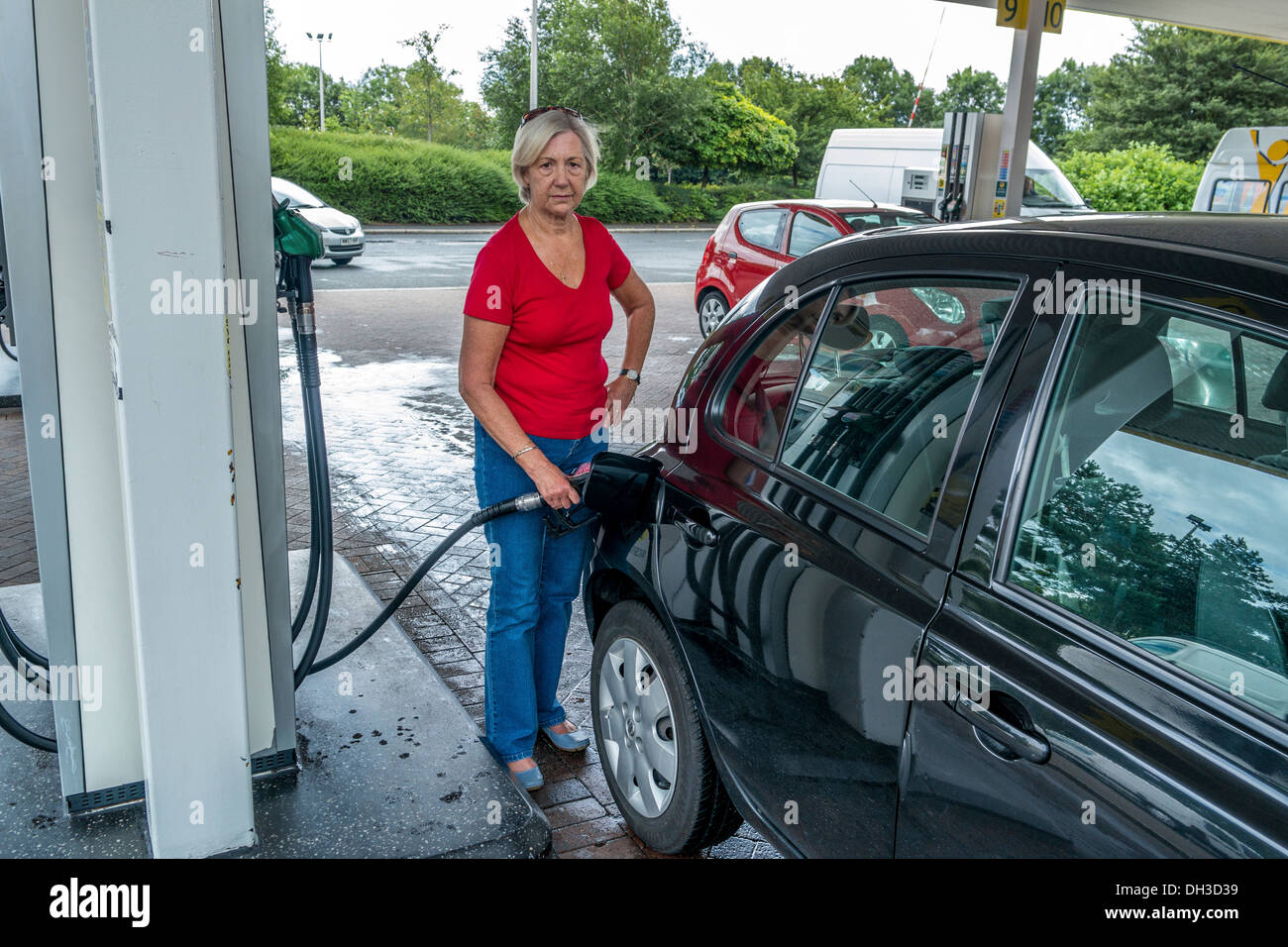 Lady petrol hi-res stock photography and images - Alamy