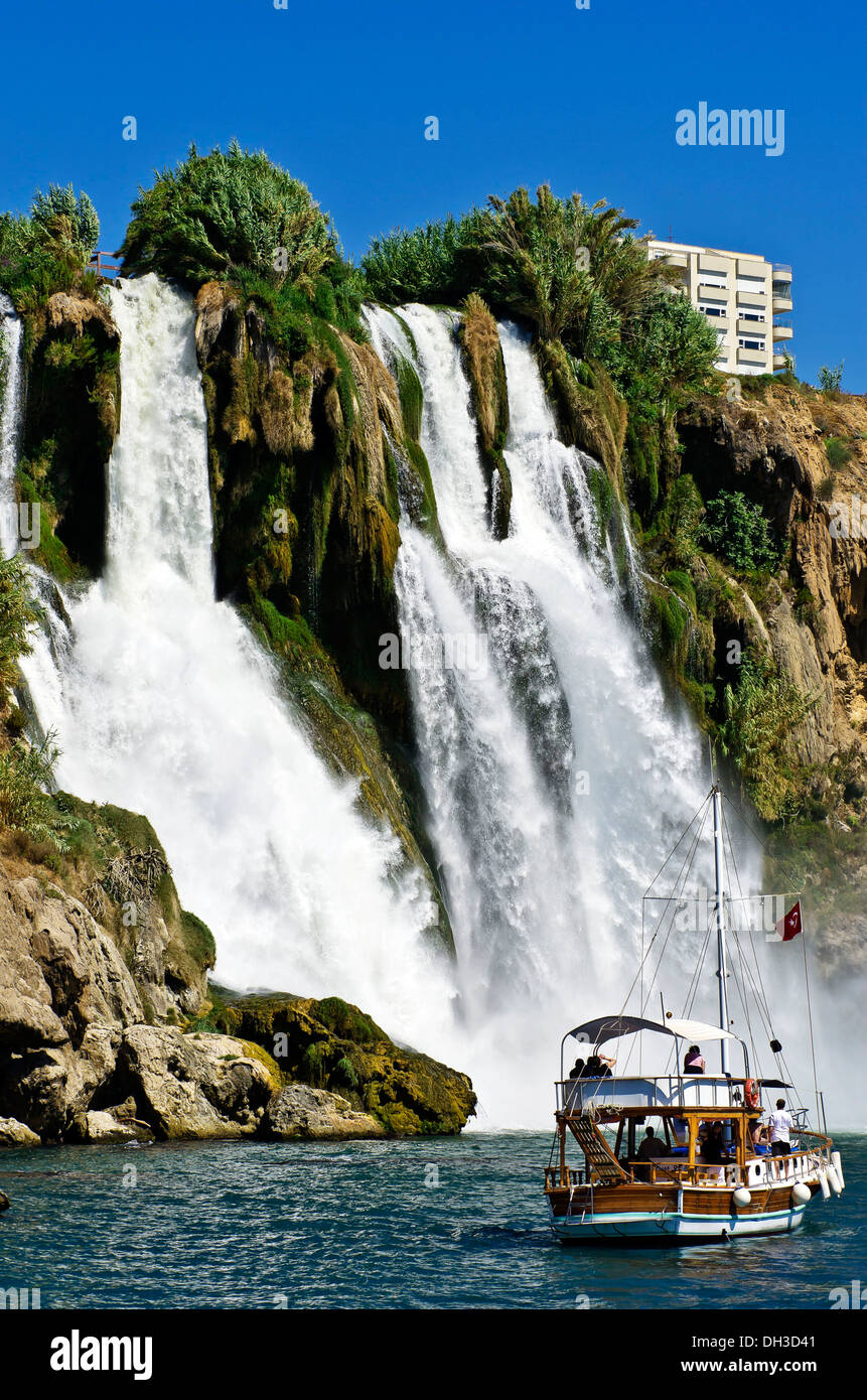 Waterfalls and a residential building on the Turkish Riviera in Antalya ...