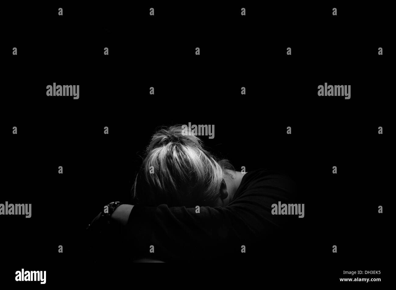 Young woman alone in Black and White Stock Photos & Images - Alamy