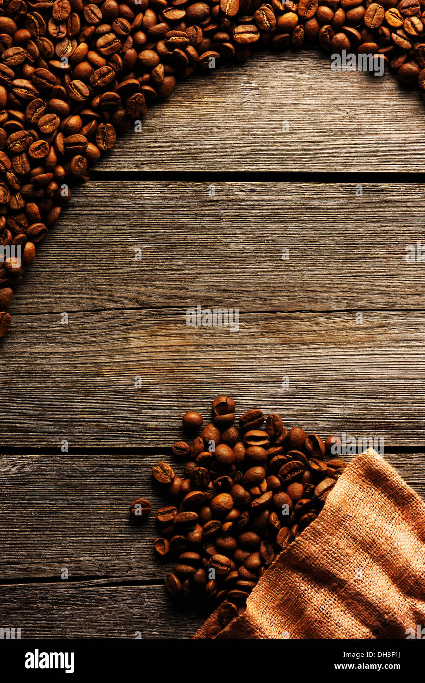Coffee beans and bag background Stock Photo - Alamy