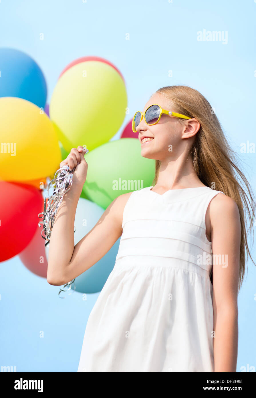 happy girl with colorful balloons Stock Photo - Alamy