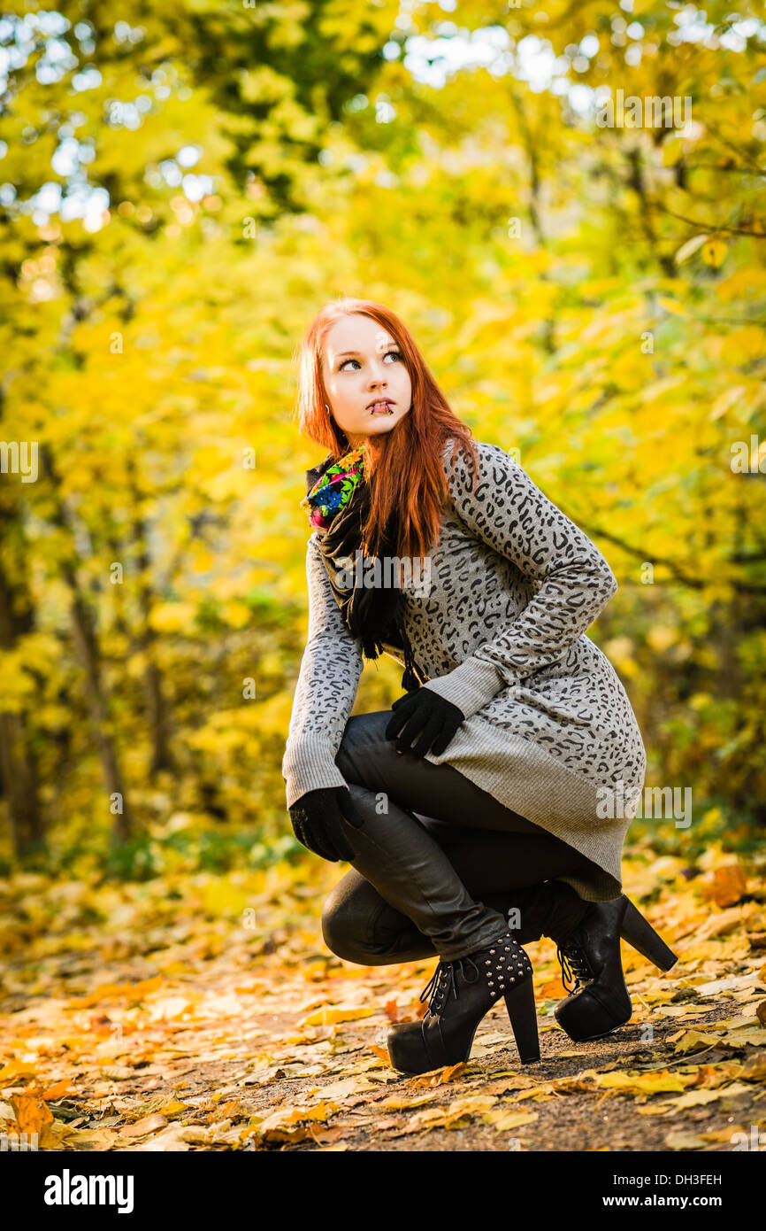 Girl with a high heels on the park, colors of autumn Stock Photo - Alamy