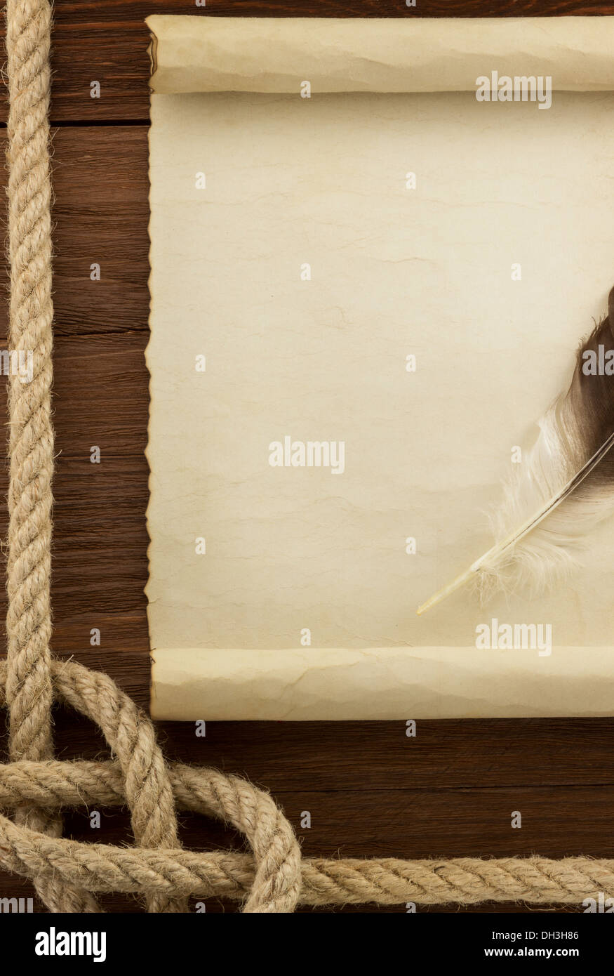 ropes and old vintage ancient paper at wood background Stock Photo - Alamy