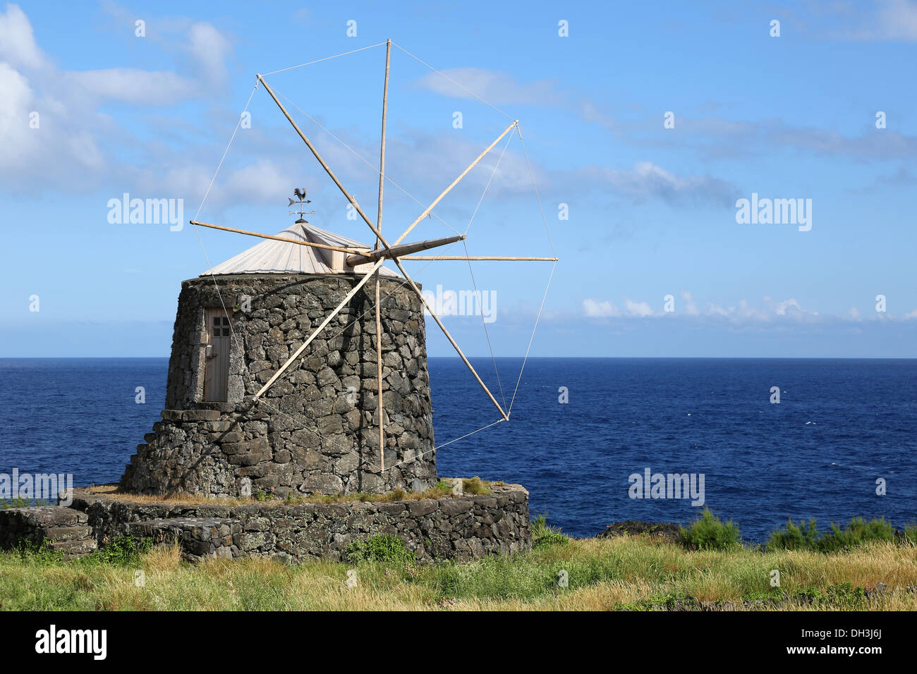 Old windmill and Atlantic Ocean on the island of Corvo Azores Portugal ...