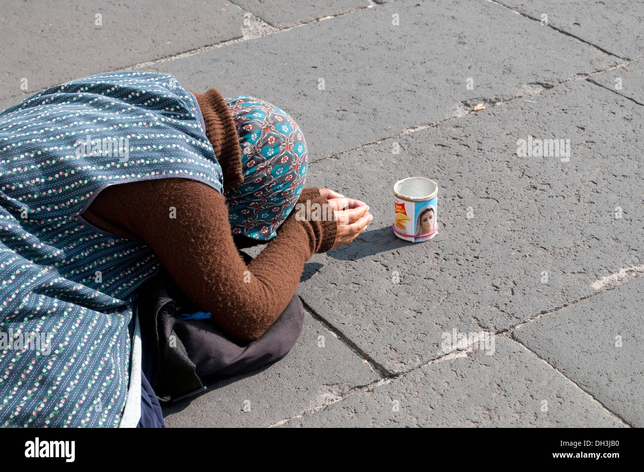 Woman begging on the street hi-res stock photography and images - Alamy