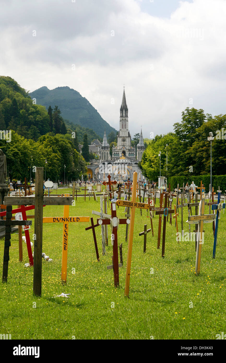 Crosses erected by pilgrims, pilgrimage site, Lourdes, Midi-Pyrenees ...