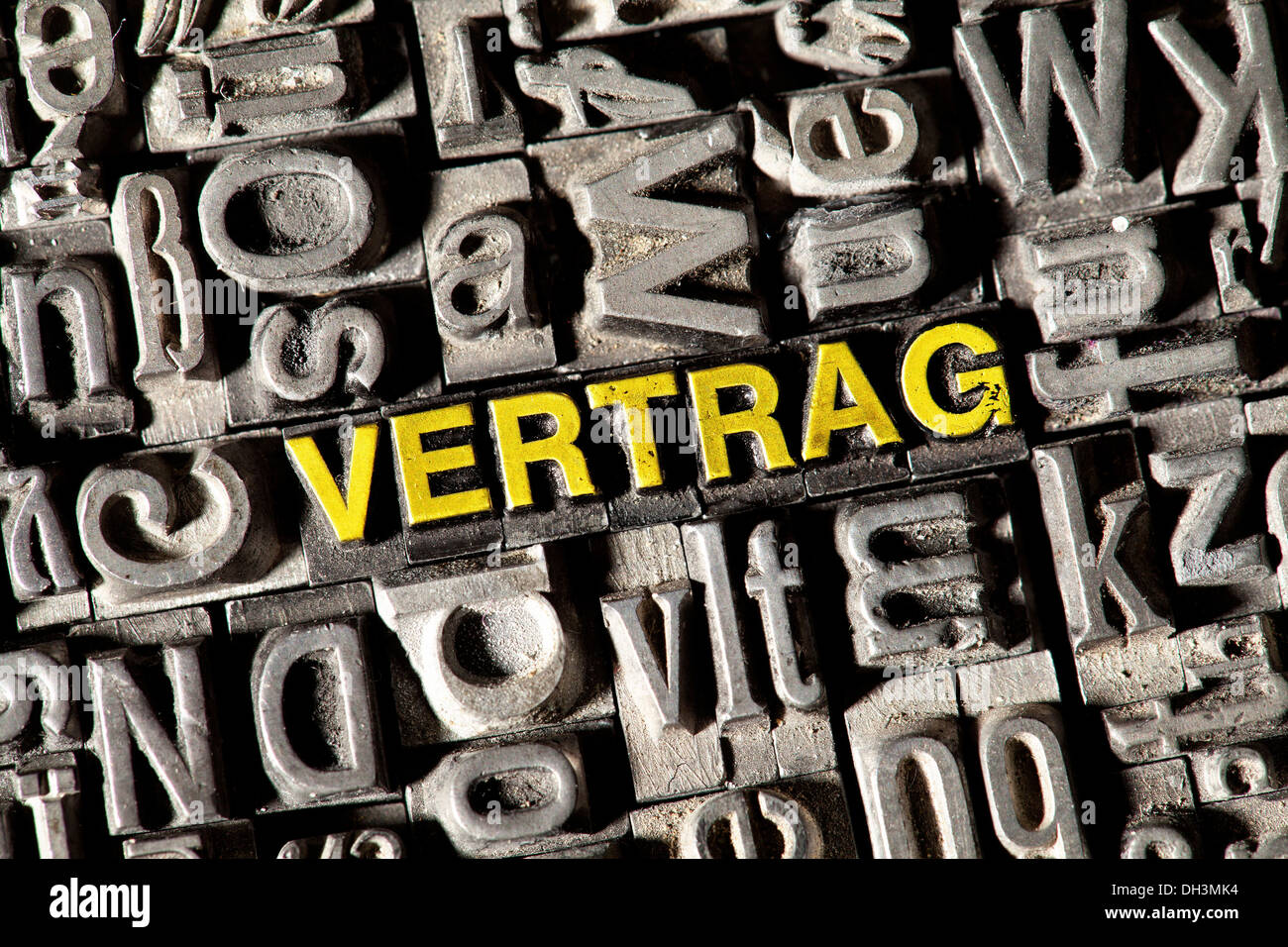 Old lead letters forming the word VERTRAG, German for contract Stock ...