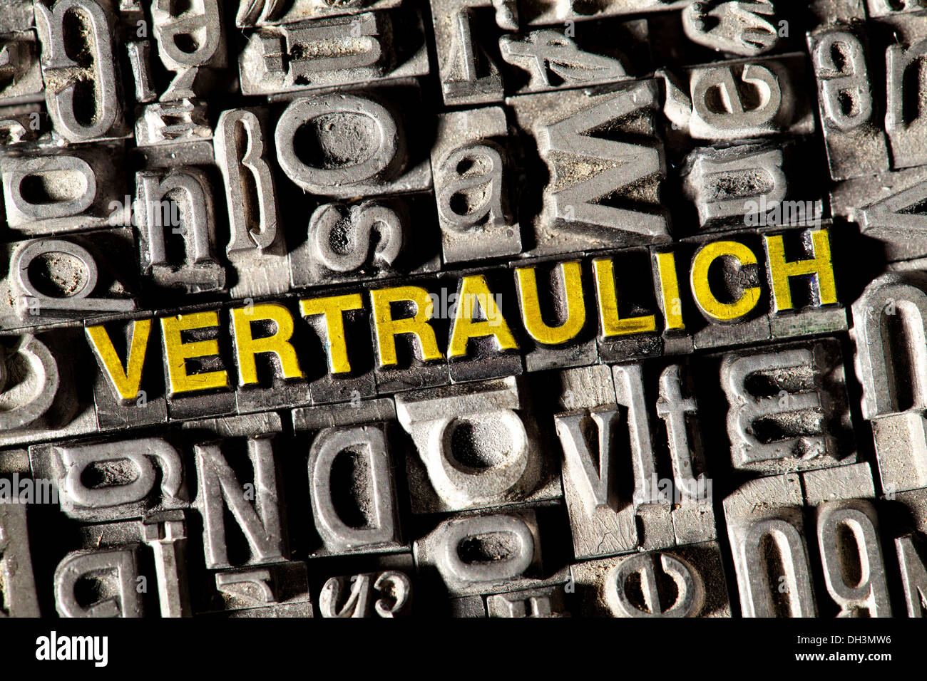 Old lead letters forming the word "VERTRAULICH", German for ...