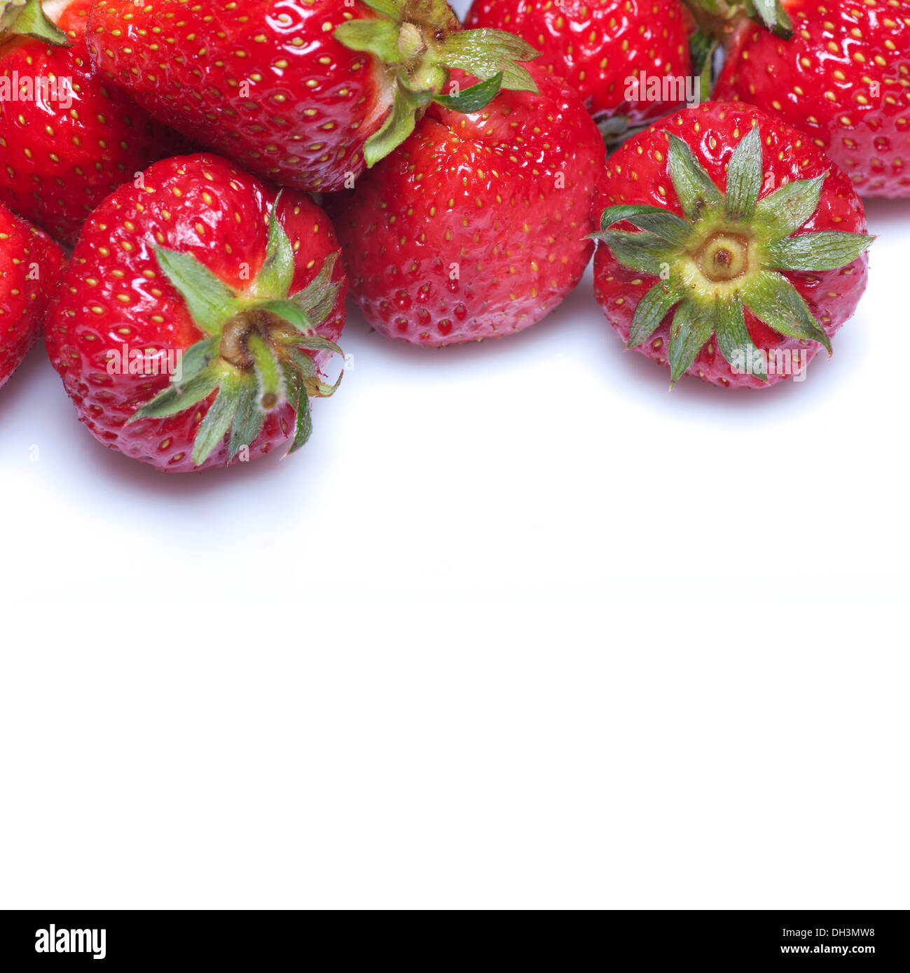 Strawberries on white background Stock Photo - Alamy
