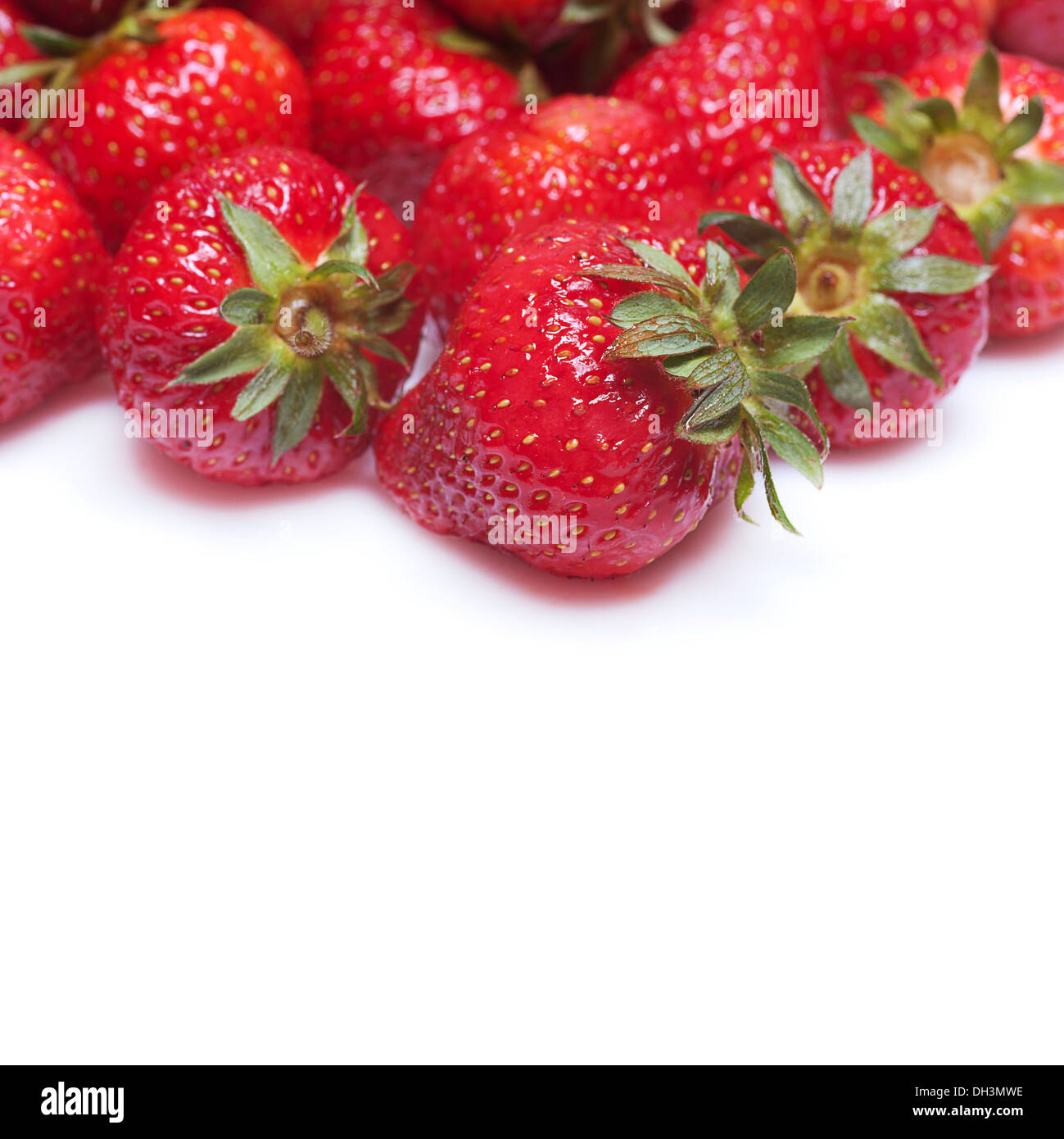Strawberries on white background Stock Photo - Alamy