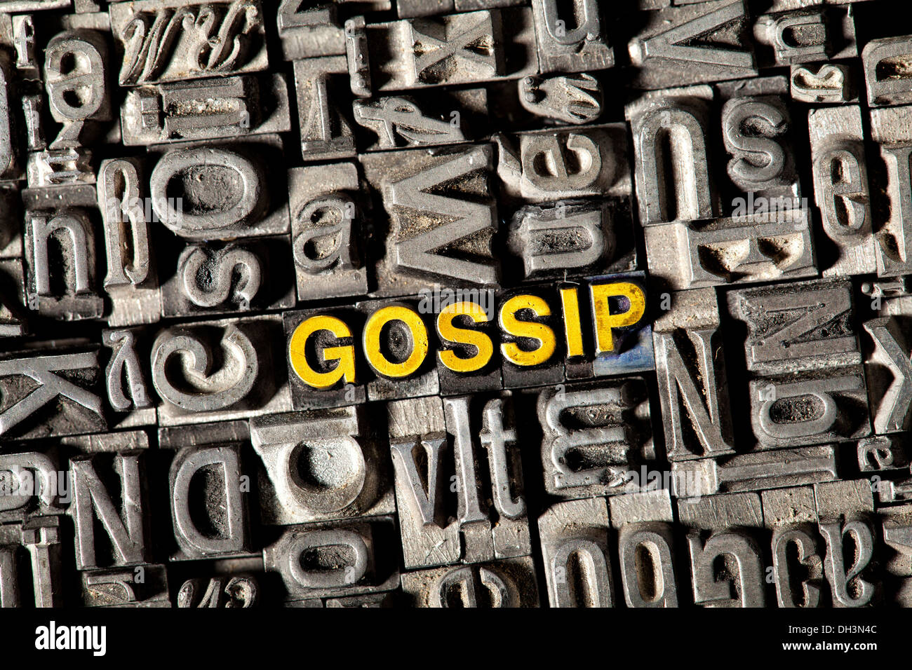Old lead letters forming the word "GOSSIP Stock Photo - Alamy
