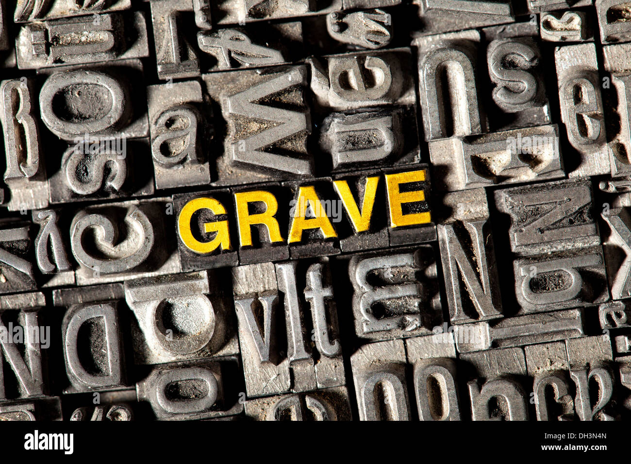 Old lead letters forming the word "GRAVE Stock Photo - Alamy