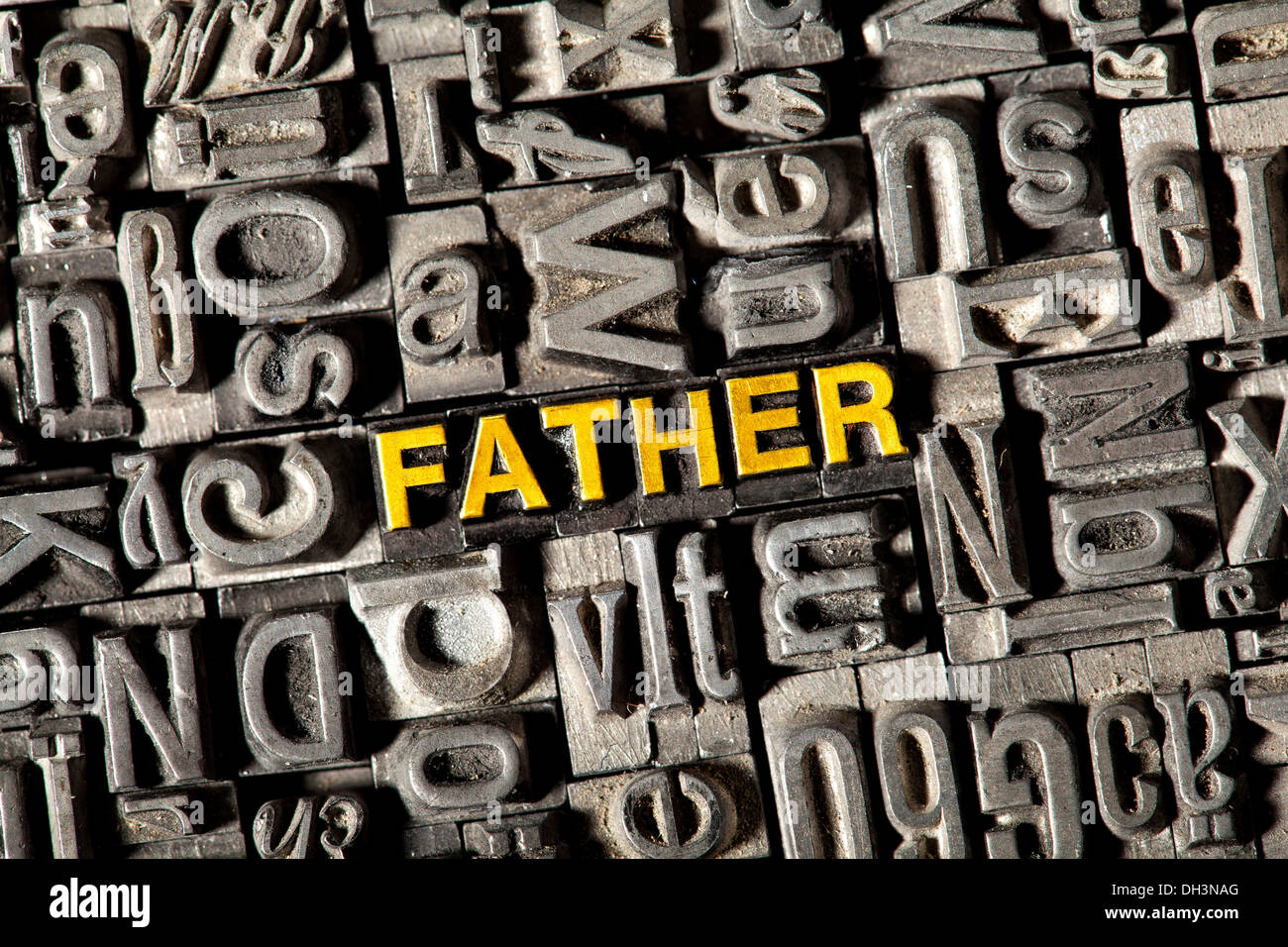 Old lead letters forming the word FATHER Stock Photo - Alamy