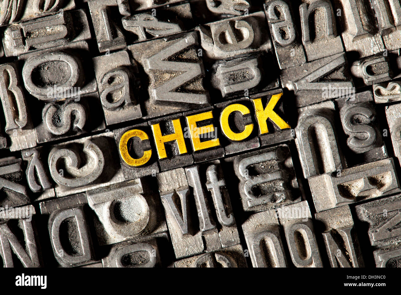 Old lead letters forming the word "check Stock Photo - Alamy