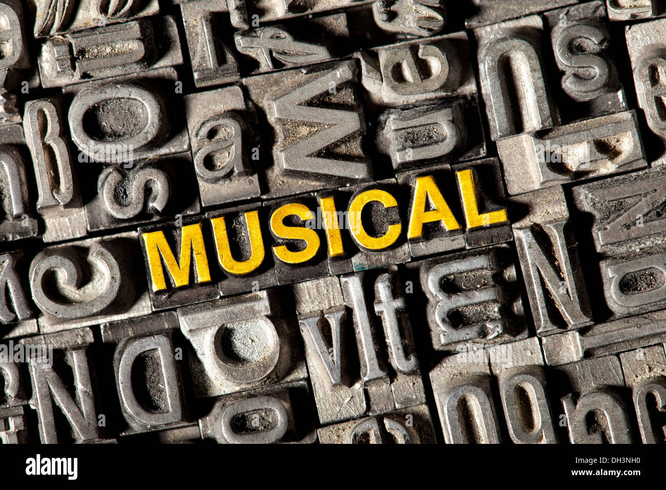 Old lead letters forming the word "MUSICAL Stock Photo - Alamy