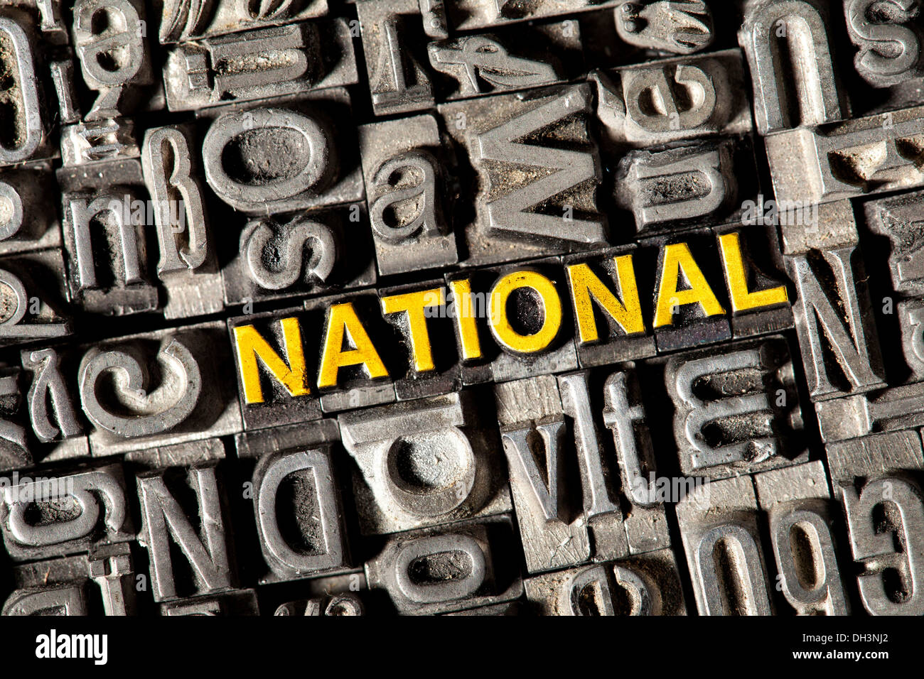 Old lead letters forming the word "NATIONAL Stock Photo - Alamy