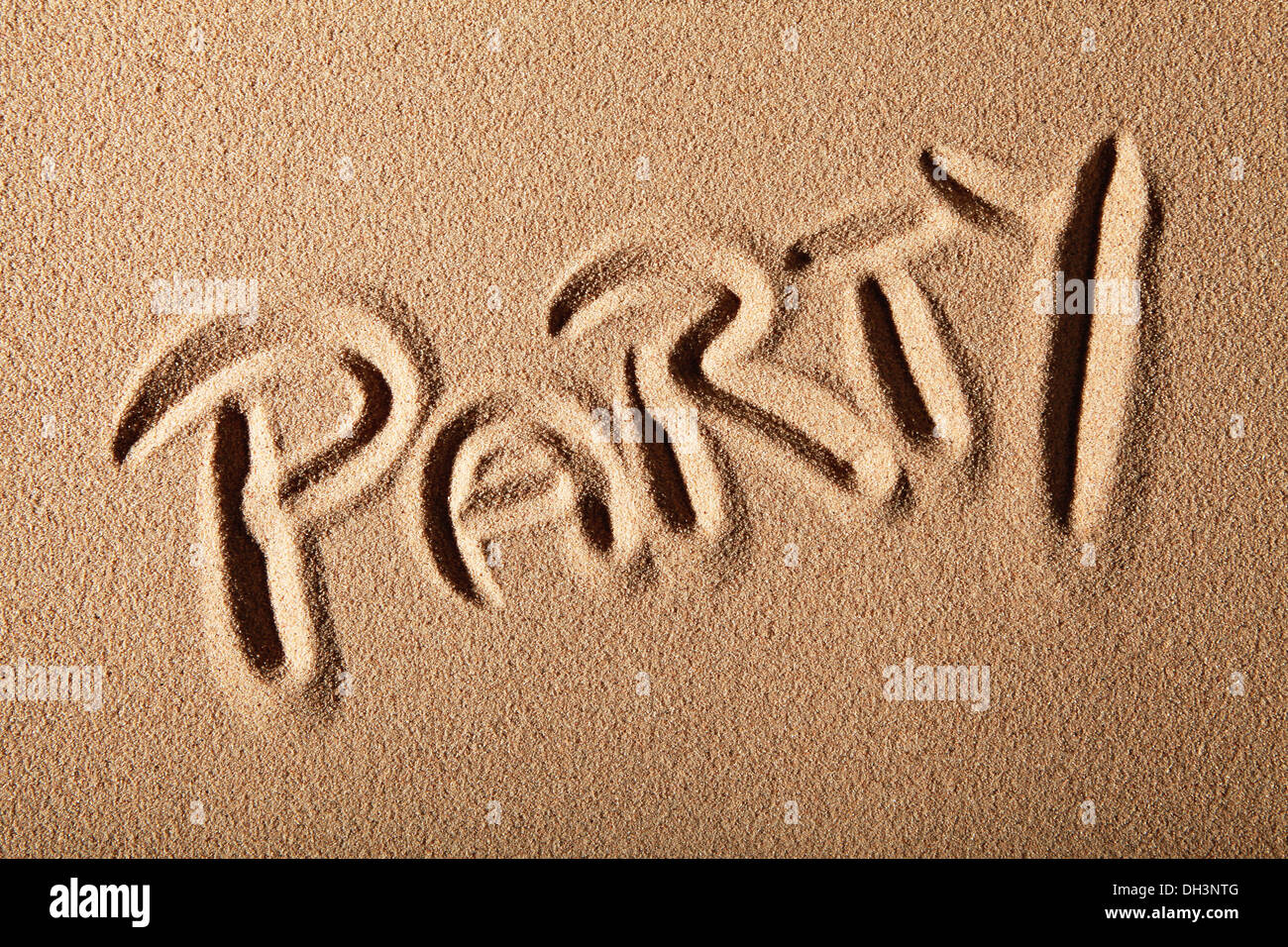 Writing in the sand "PARTY Stock Photo - Alamy