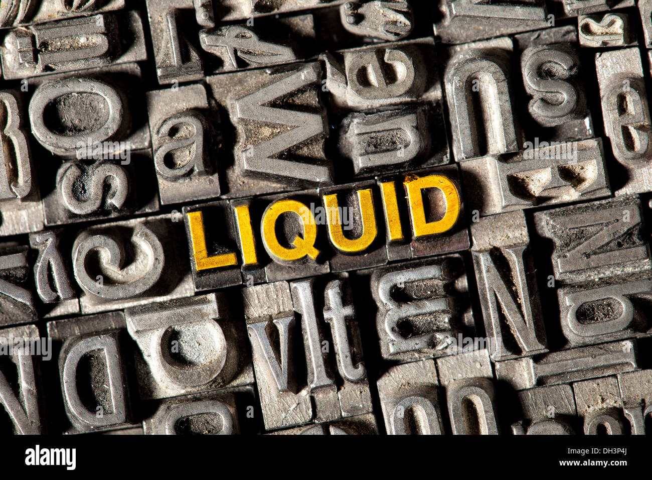Old lead letters forming the word "LIQUID Stock Photo - Alamy