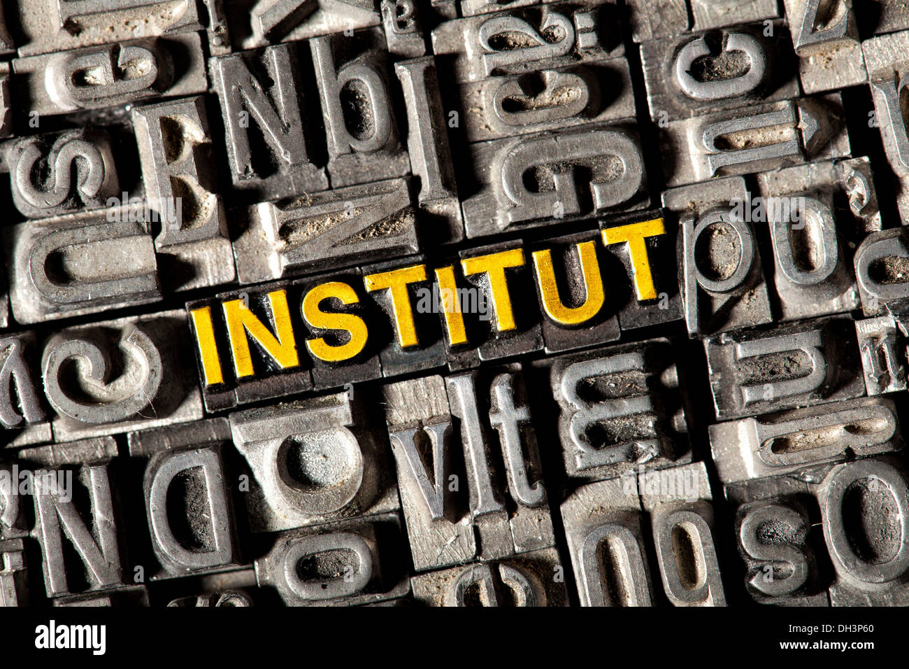 Old lead letters forming the German word "INSTITUT", "institute Stock ...