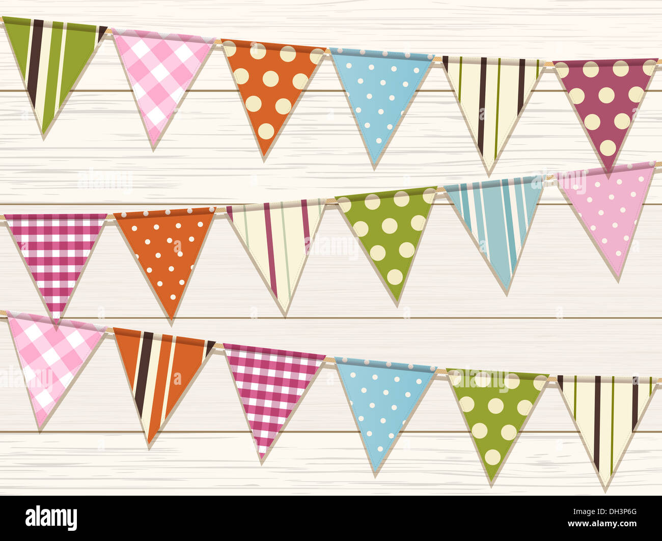 Bunting with bright patterns on a white wood background Stock Photo - Alamy