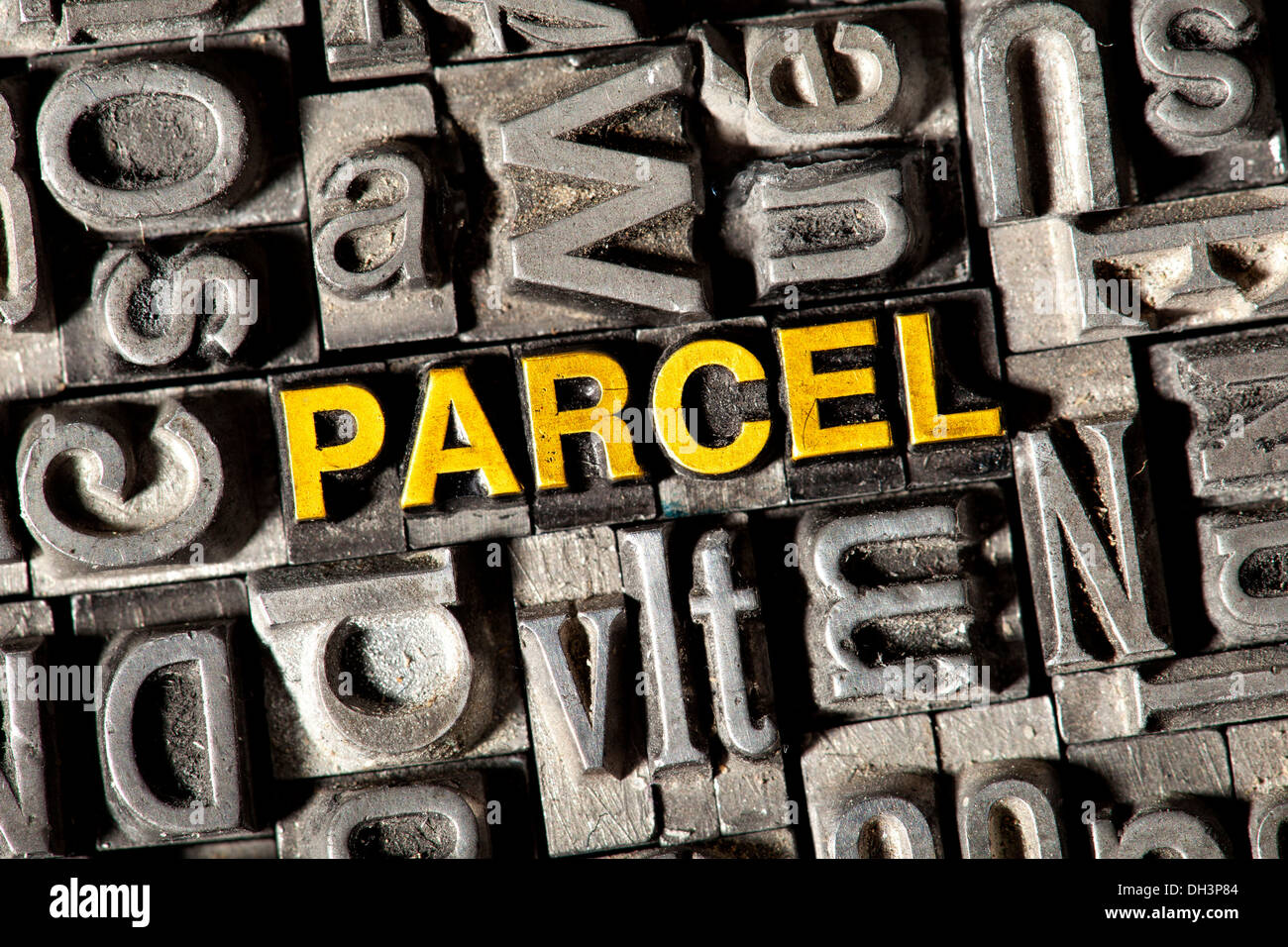 Old lead letters forming the word PARCEL Stock Photo - Alamy
